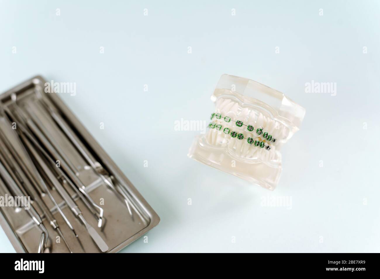 Stainless steel medical tray with dental instruments: mirror, probe ...