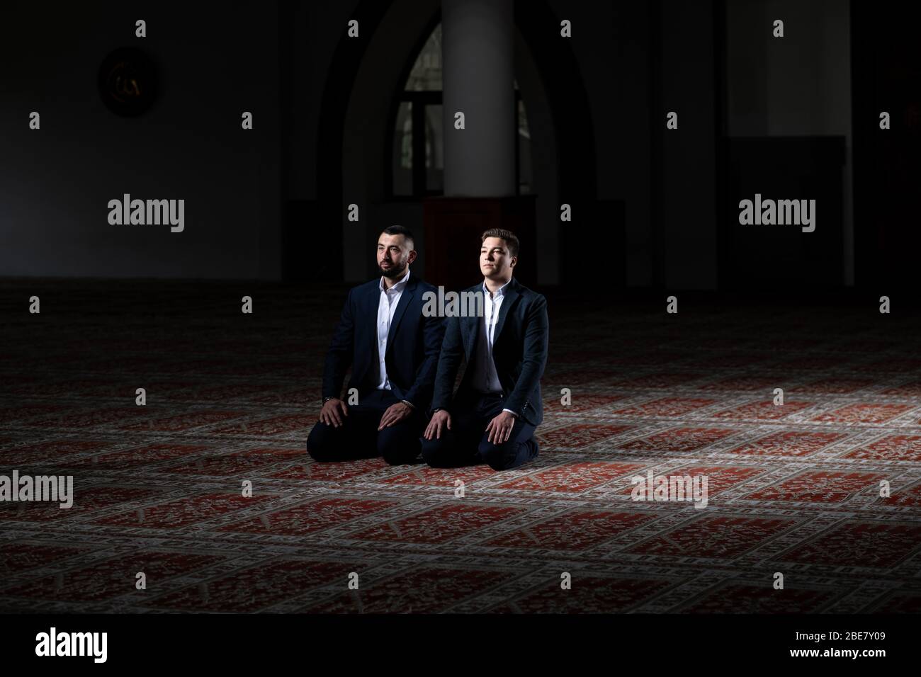 Two Attractive Man Making Traditional Prayer to God Allah in the Mosque ...