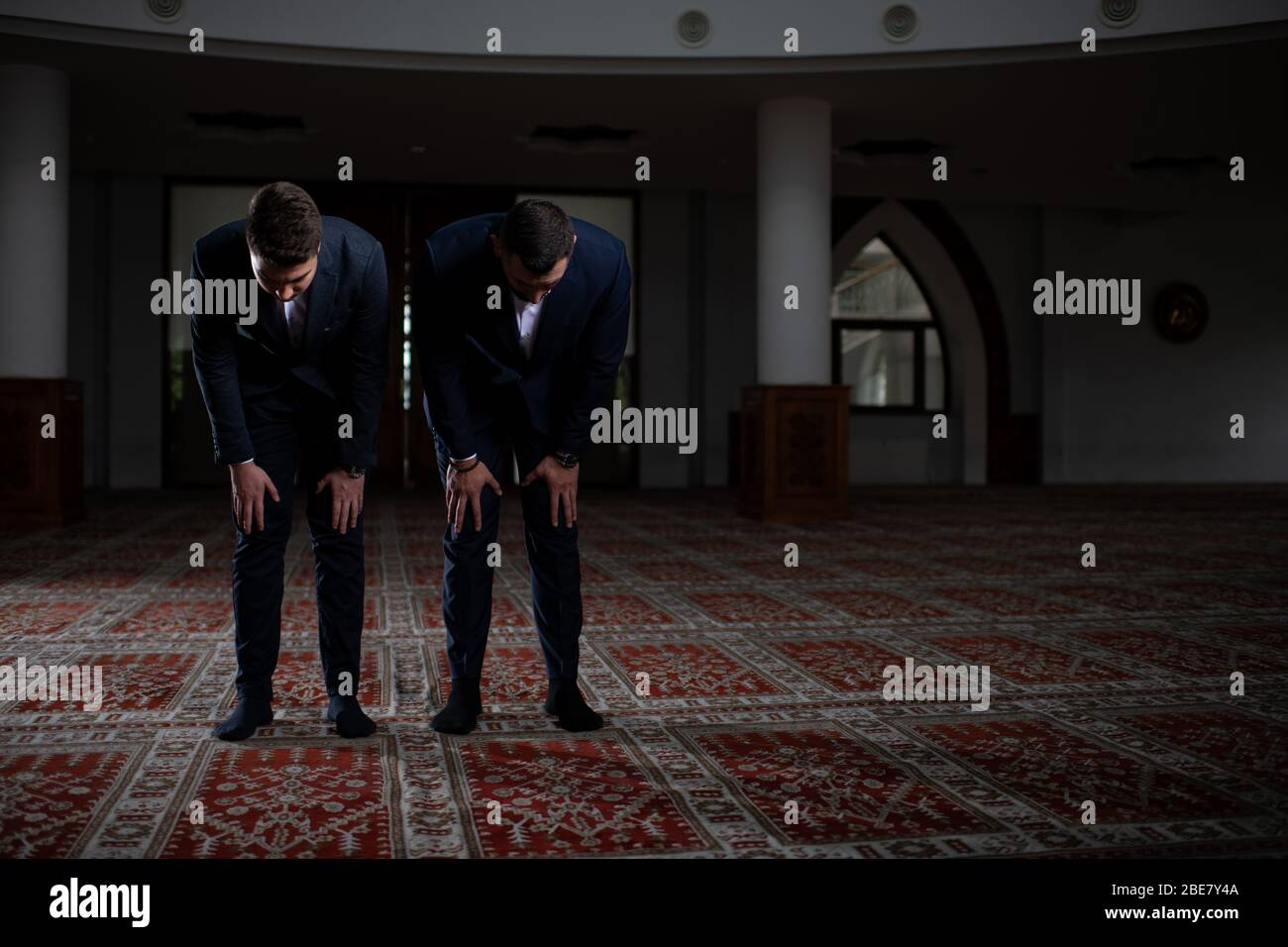 Two Attractive Man Making Traditional Prayer to God Allah in the Mosque ...