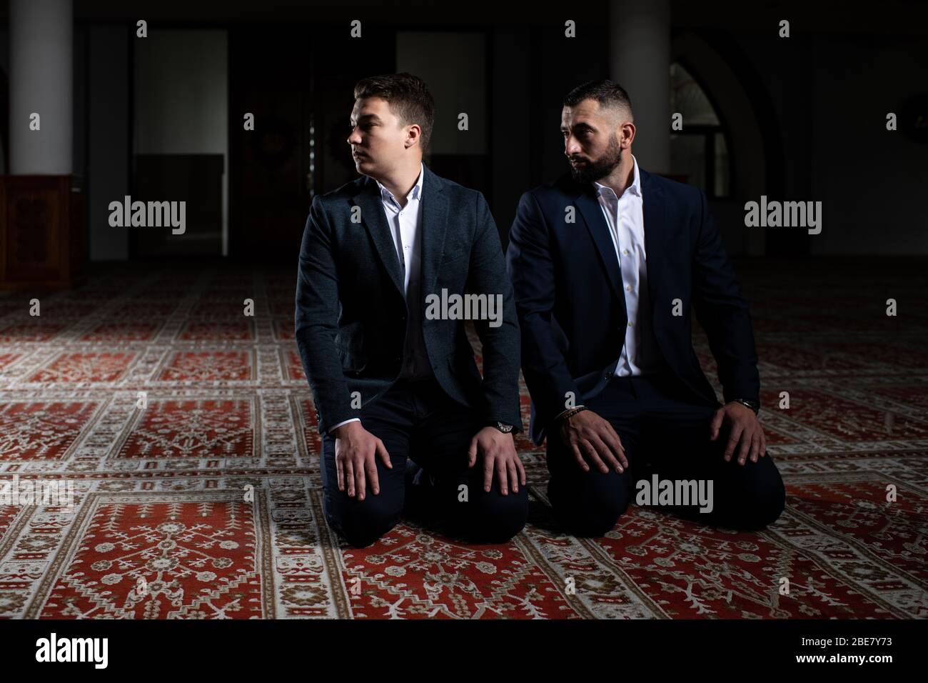 Two Attractive Man Making Traditional Prayer to God Allah in the Mosque ...