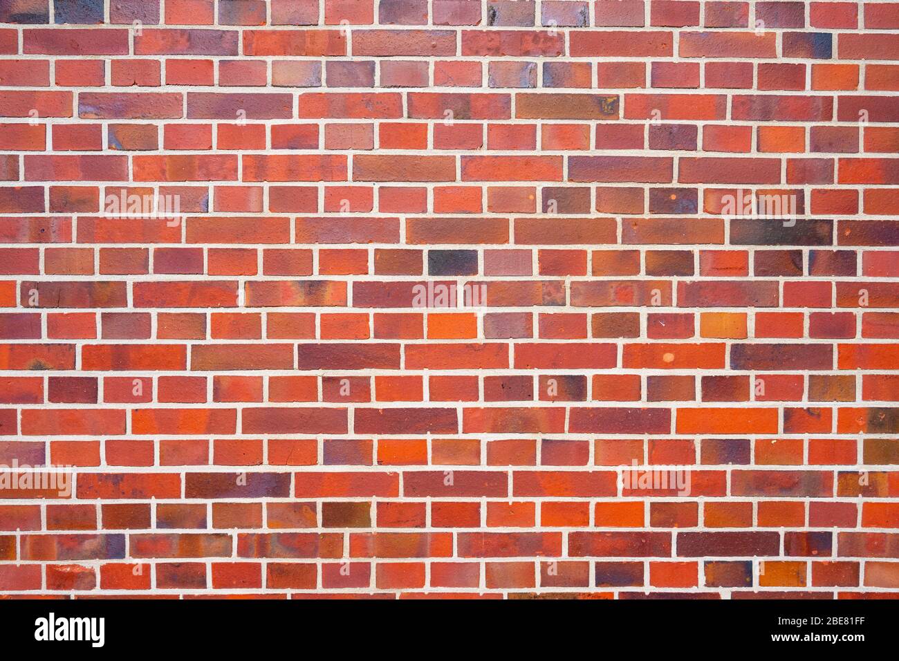 Background from a clean red brick wall Stock Photo - Alamy