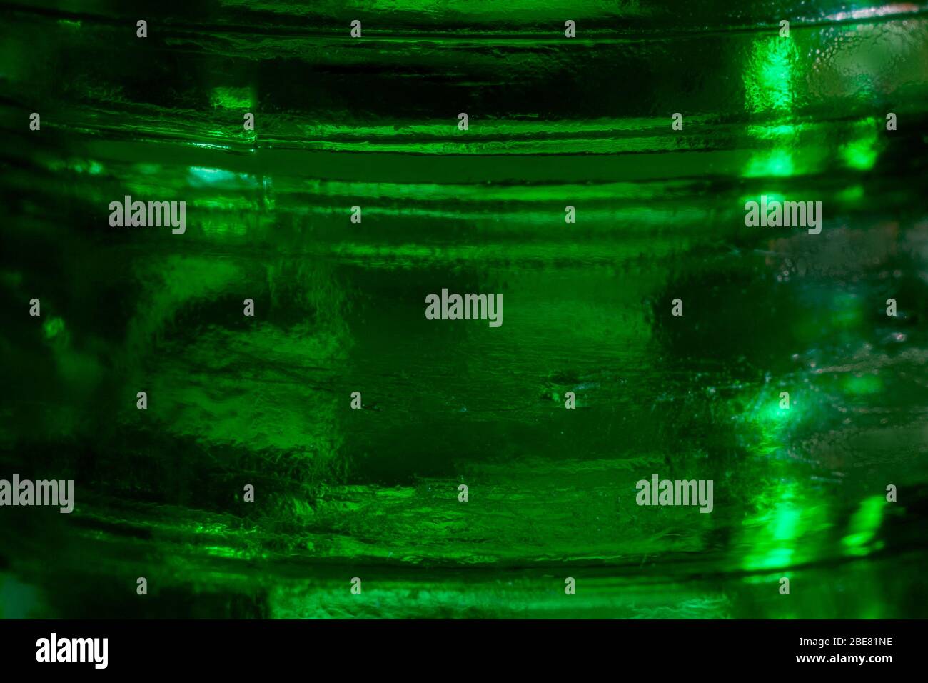 Bottleneck close. Green textured background. Bottle neck close up ...