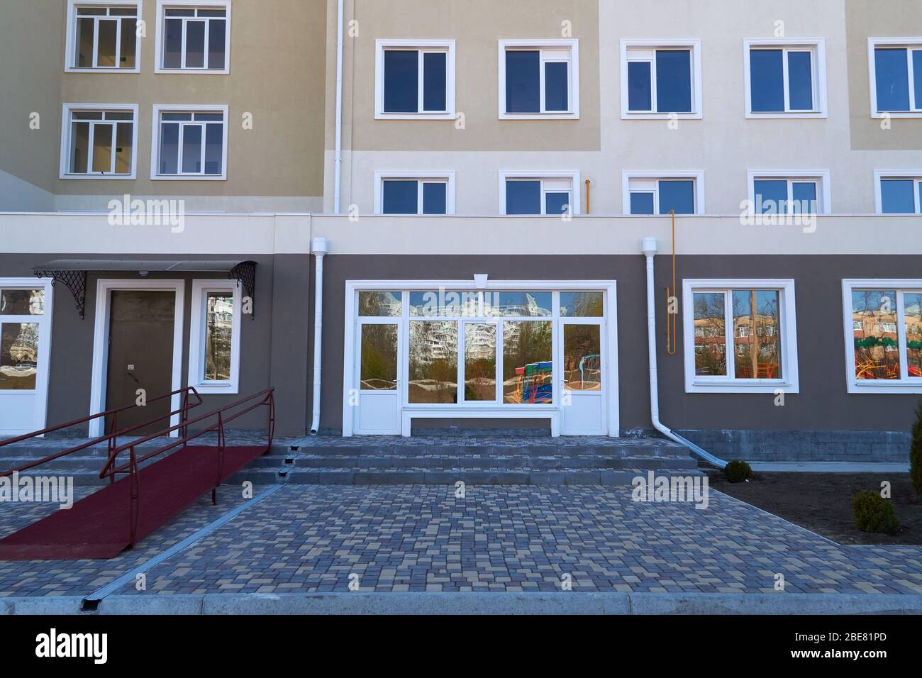 Wheelchair access ramp for entrance of residential multistory building ...