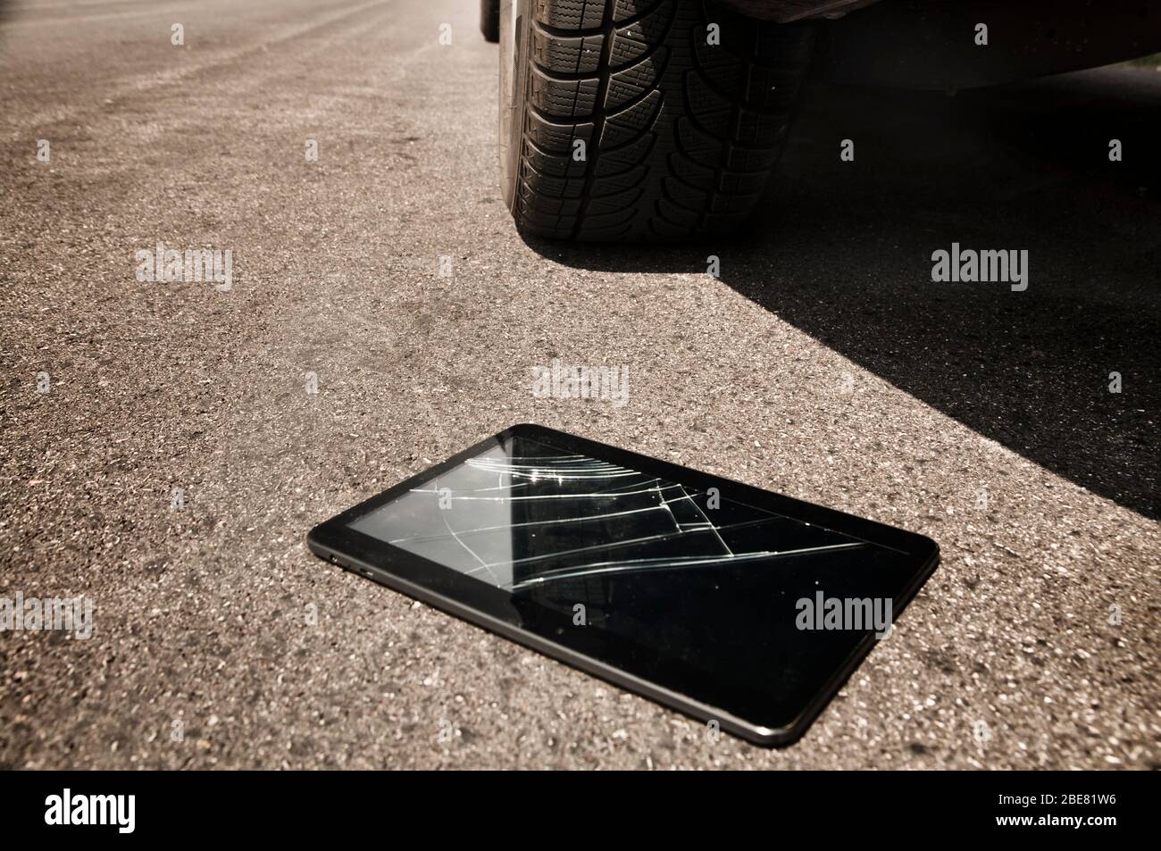 Car accidentaly went through a tablet screen. Broken electronic device ...