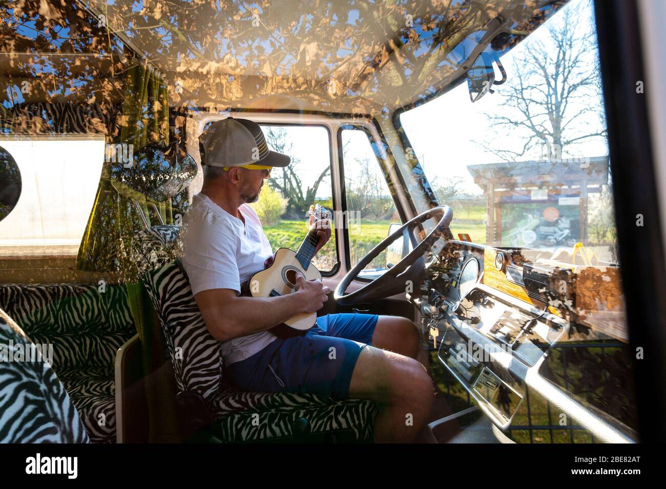 Portrait of careless man during holidays camping in his van Stock Photo ...