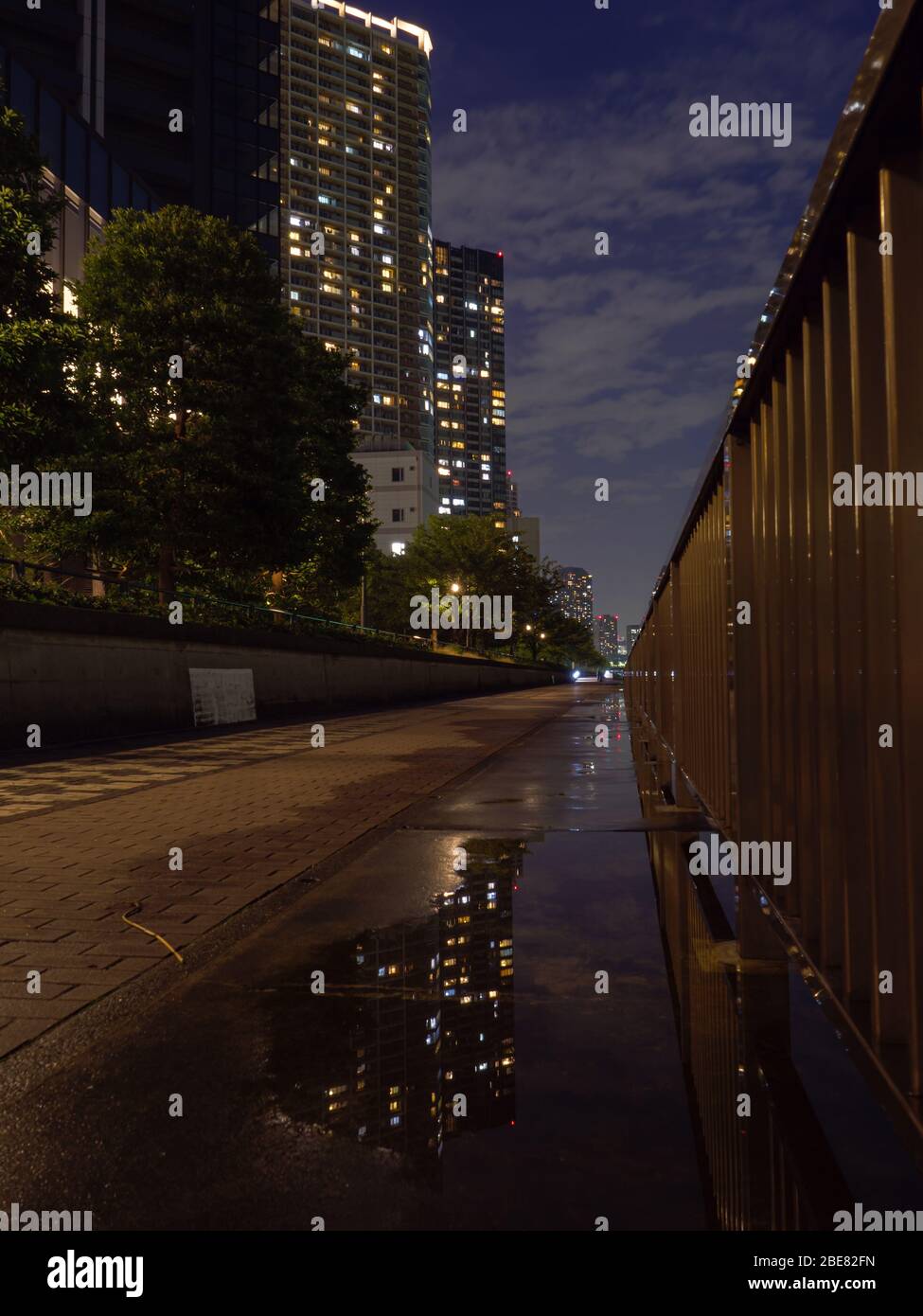 High rise buildings reflected in the rain in Tokyo Stock Photo - Alamy