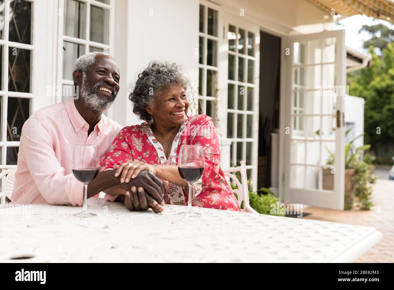African american couple sitting outdoors hi-res stock photography and ...