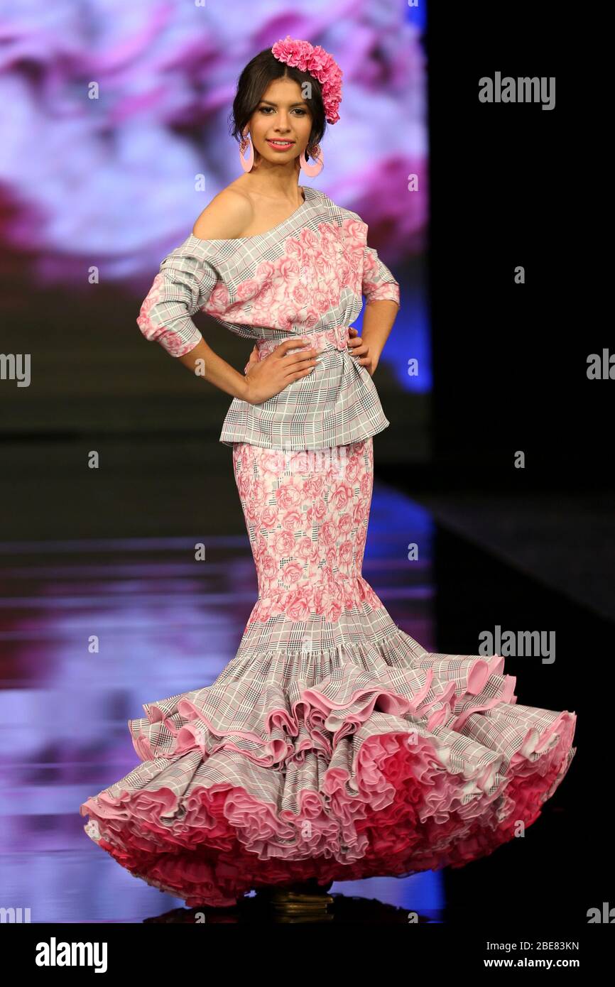 SEVILLA, SPAIN - JAN 30: Model wearing a dress from the Tora collection ...