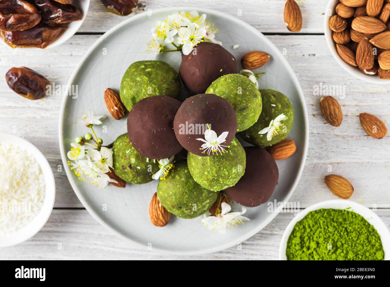 Raw vegan energy balls made of matcha tea, dates and nuts and balls in ...