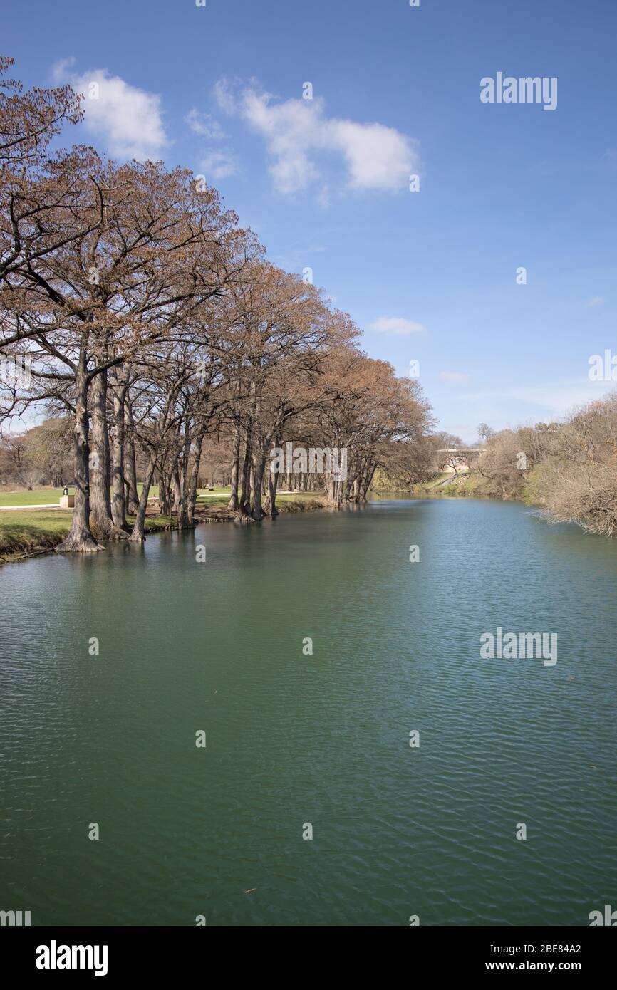 river trail along the guadalupe river in the small hill country town of ...