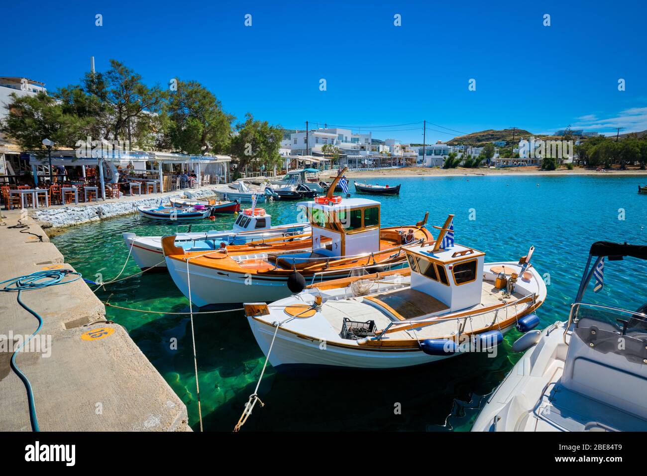 The beach and fishing village of Pollonia in Milos, Greece Stock Photo ...