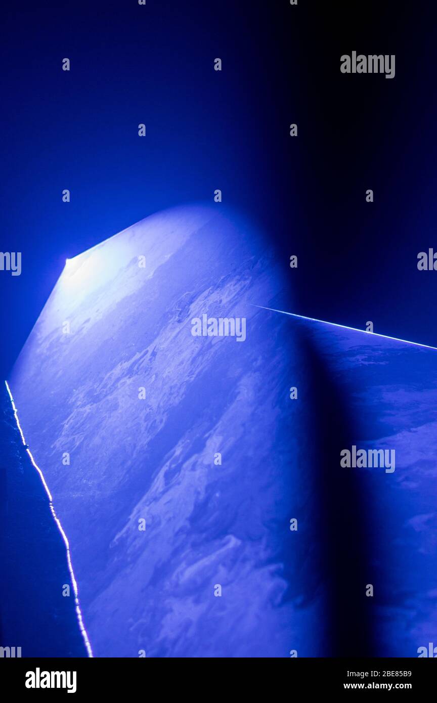 fanned out blue laser beam in smoke Stock Photo - Alamy