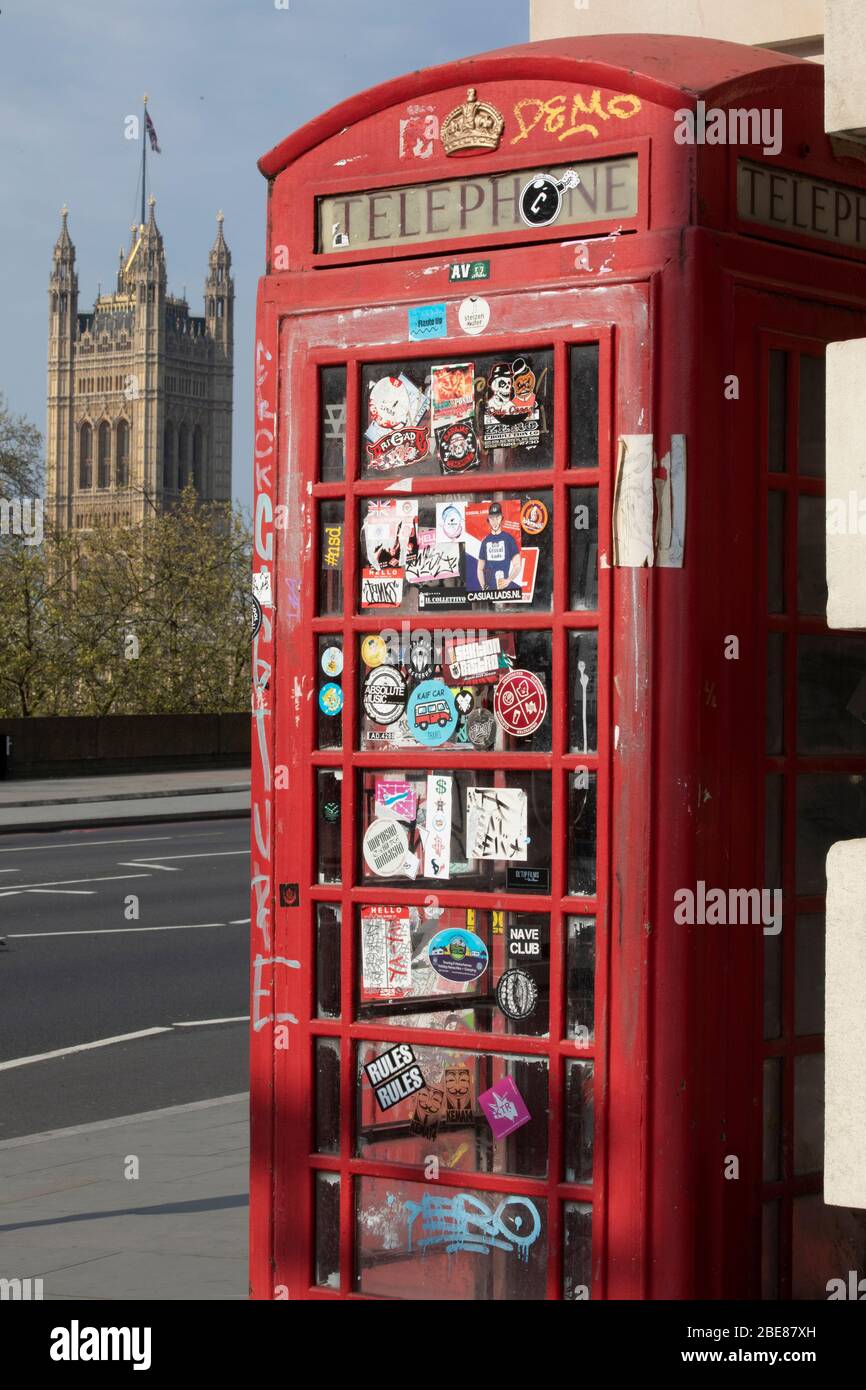 Stickers on telephone box windows hi-res stock photography and images ...