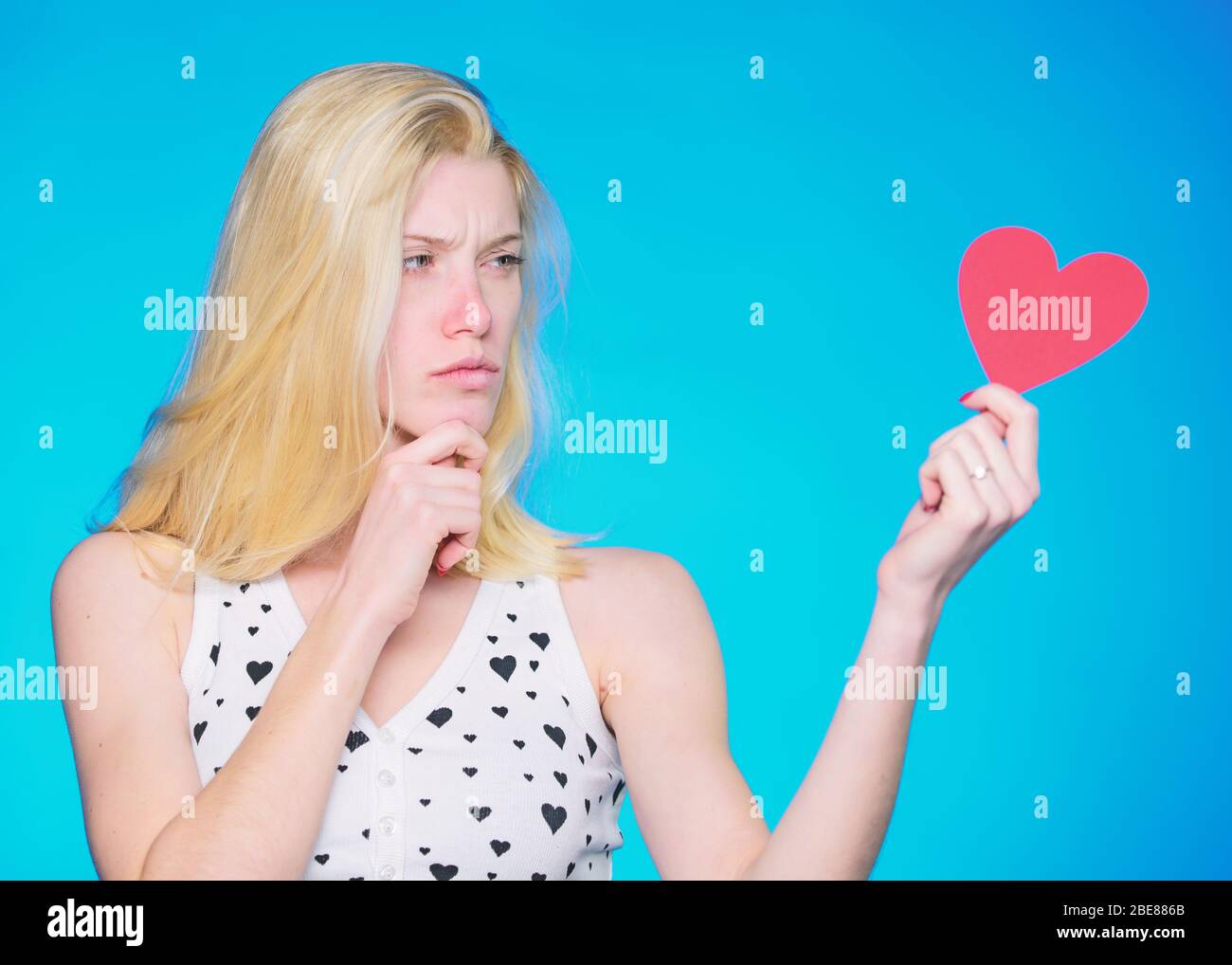 who is my valentine. Love and romance. thoughtful woman on blue ...