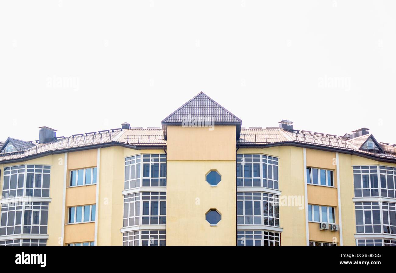 Beautiful modern multi-storey building with windows. Stylish ...
