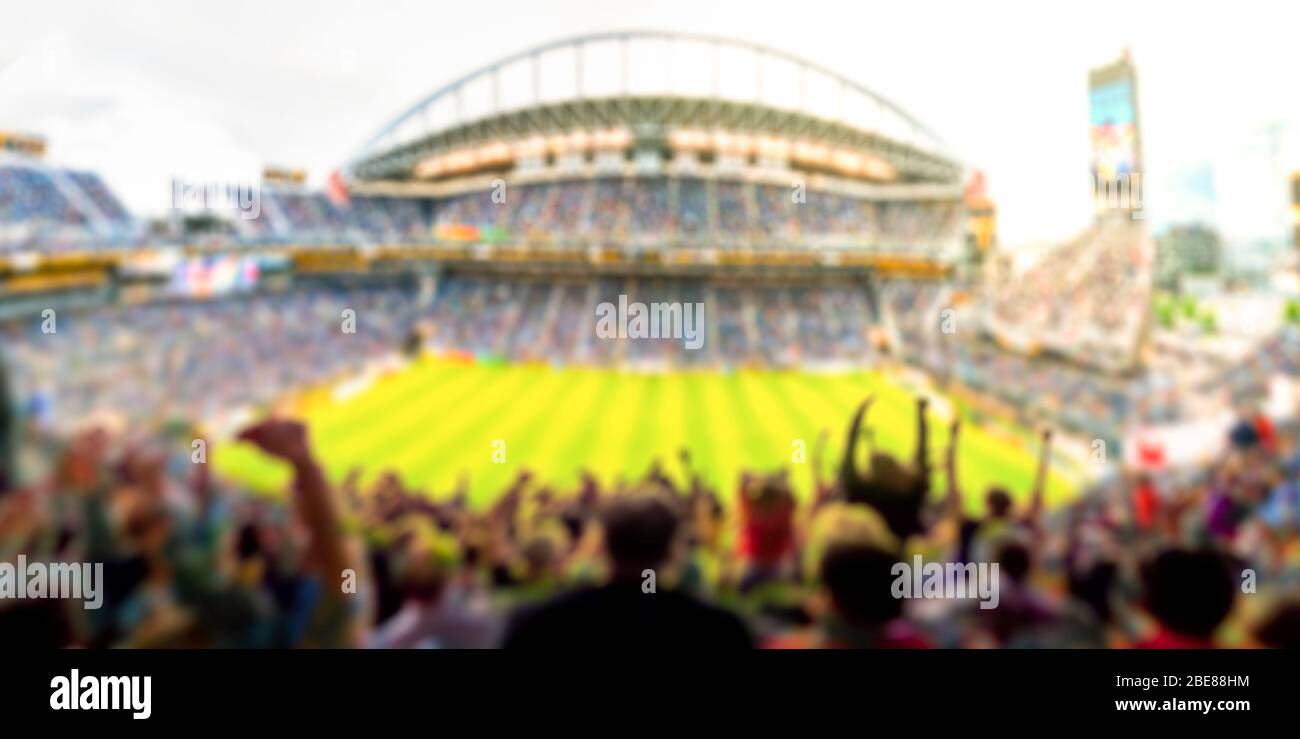 Blurred crowd in stadium spectators hi-res stock photography and images ...