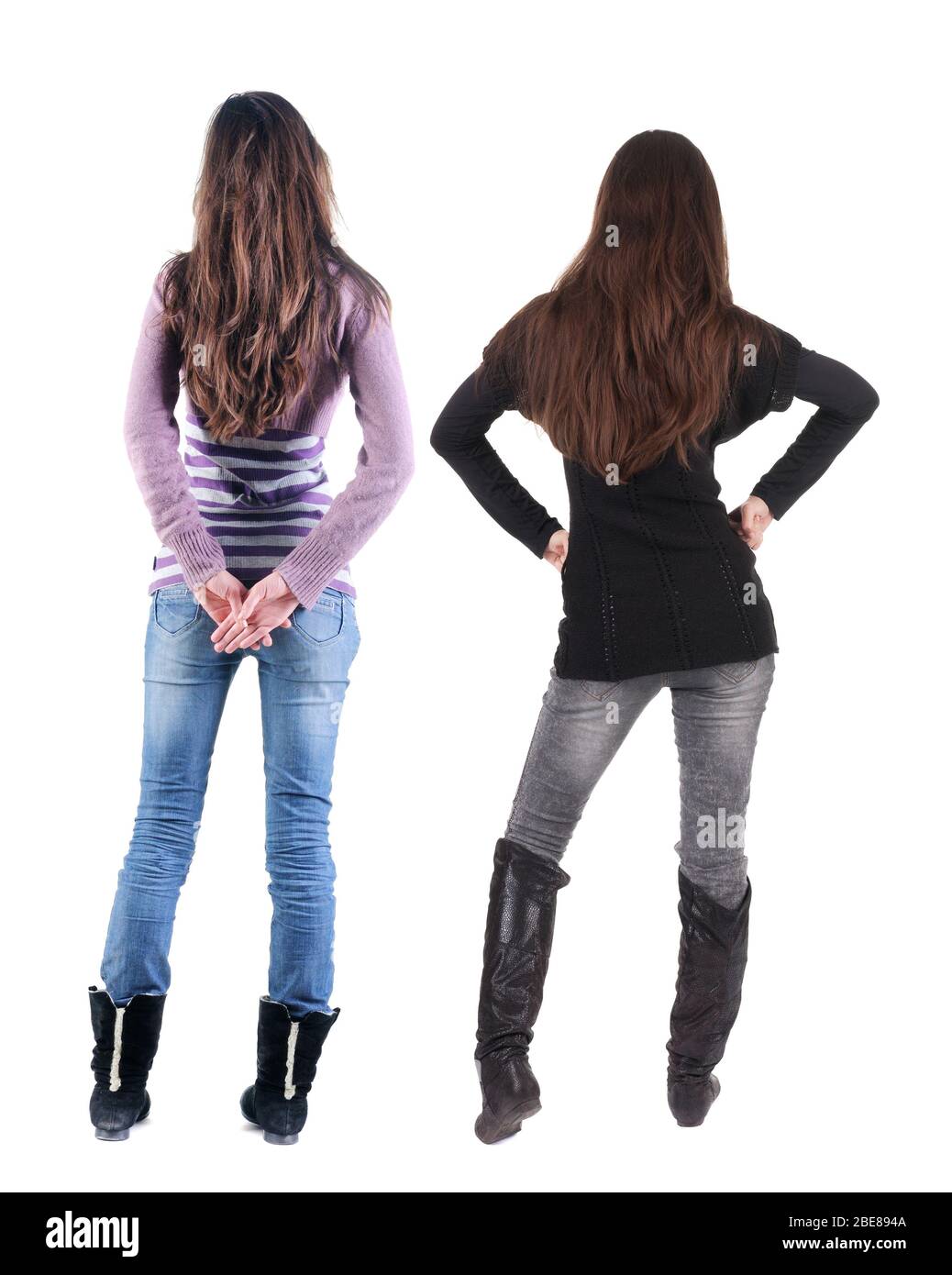 Back view of two woman in sweater. Rear view people collection ...