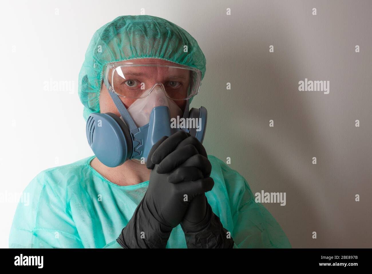 Male nurse, with twin filter half face respirator mask , protective ...