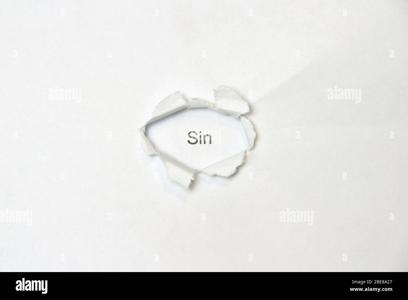 Word sin on white isolated background, the inscription through the ...