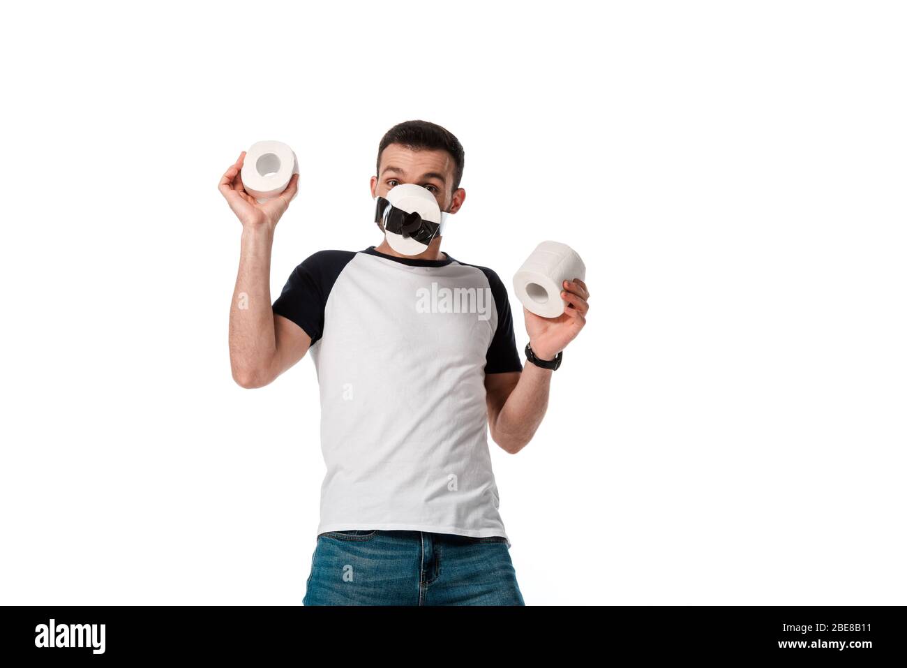 man with scotch tape and toilet paper on face holding soft paper rolls ...