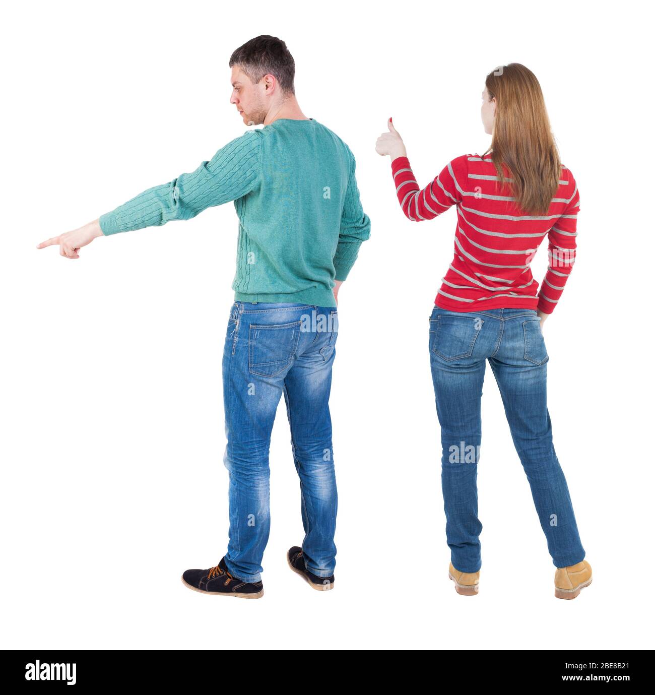 Back view of couple in sweater pointing. Rear view people collection ...