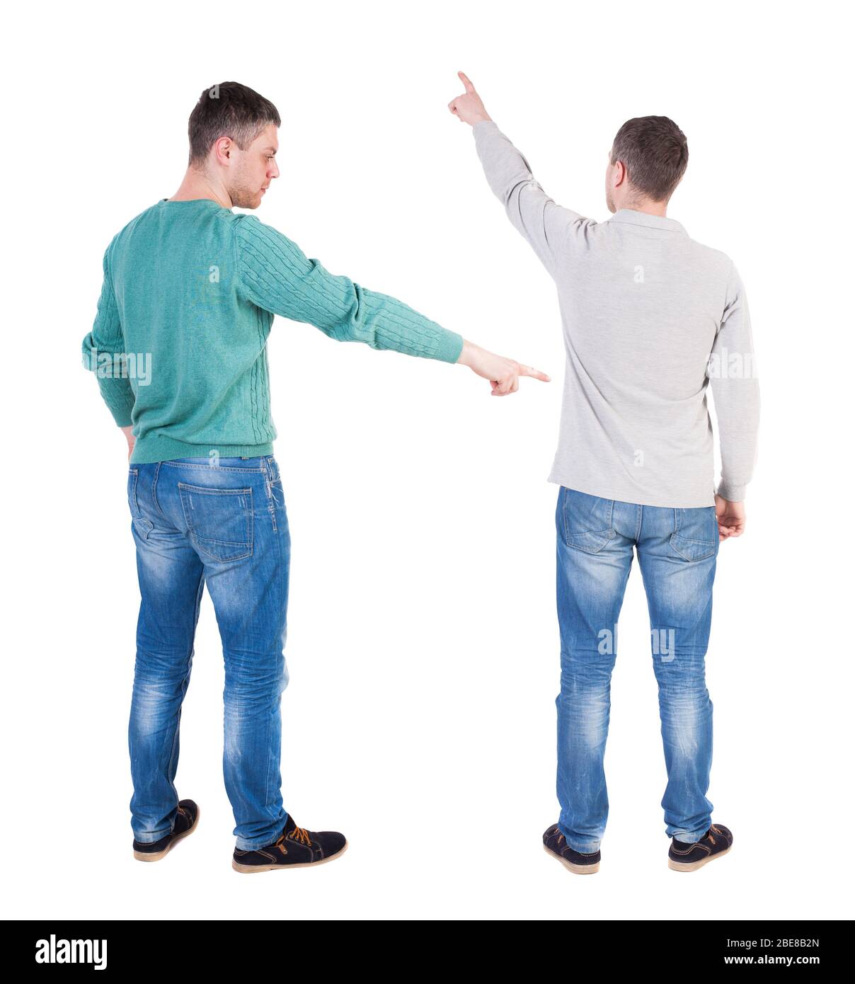 Back view of two man in sweater pointing. Rear view people collection ...