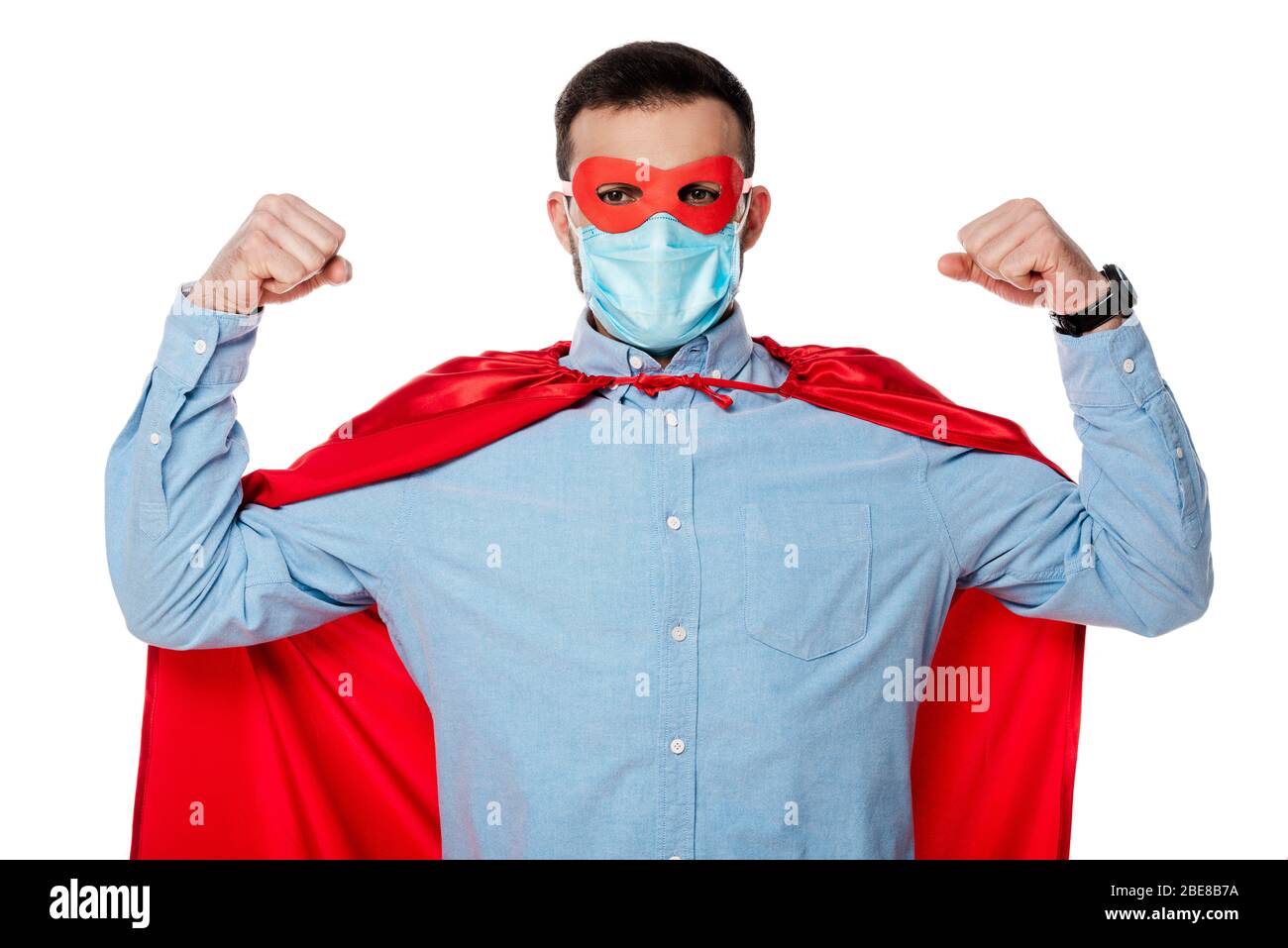 man in superhero costume and medical mask showing muscles isolated on ...