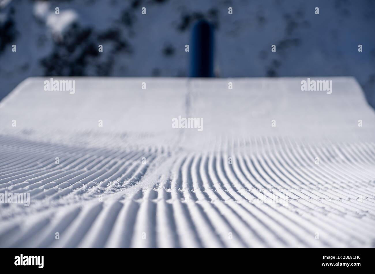 Pattern of the snow in a freshly groomed ski slope in the snowpark of ...
