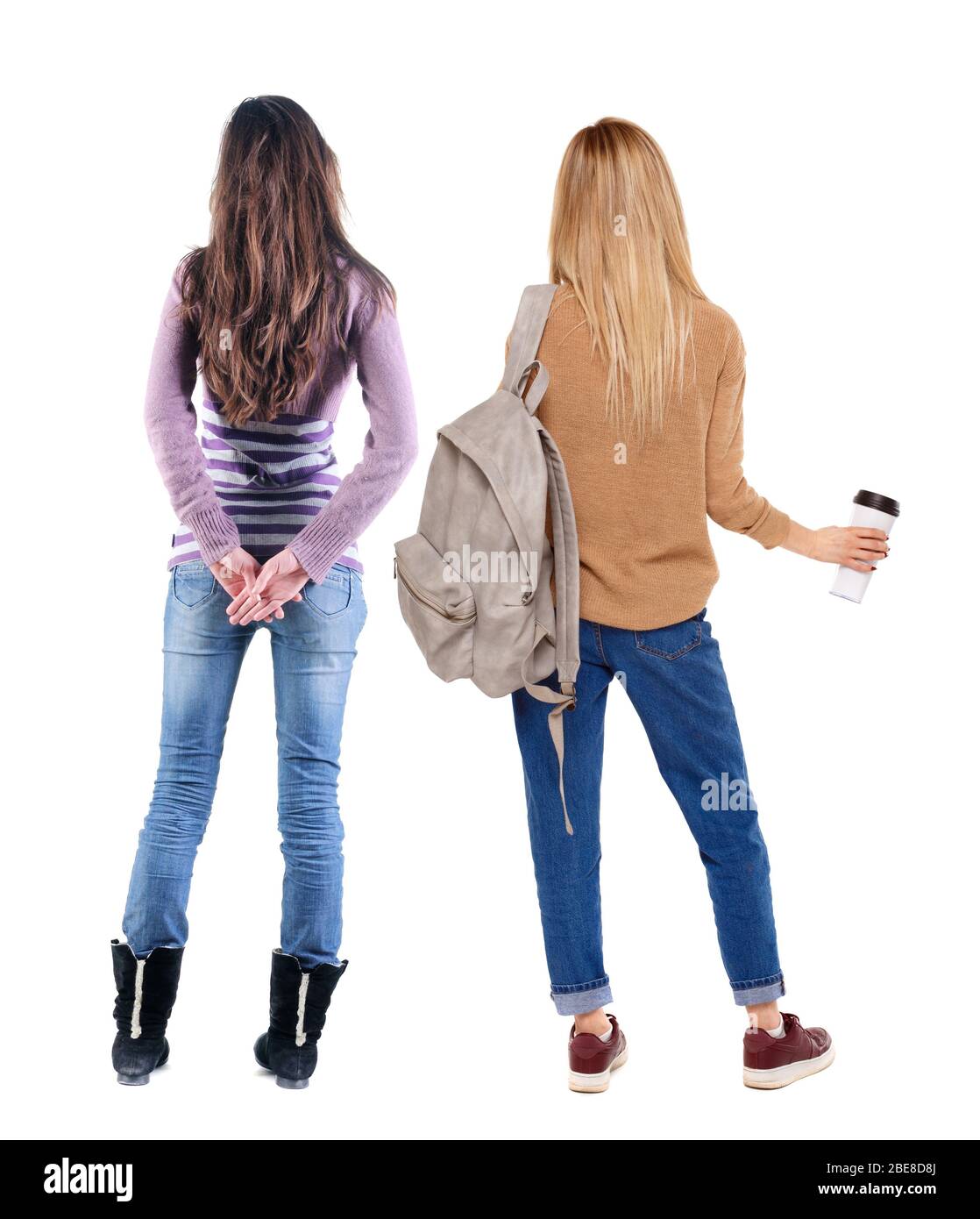 Back view of two woman in sweater. Rear view people collection ...