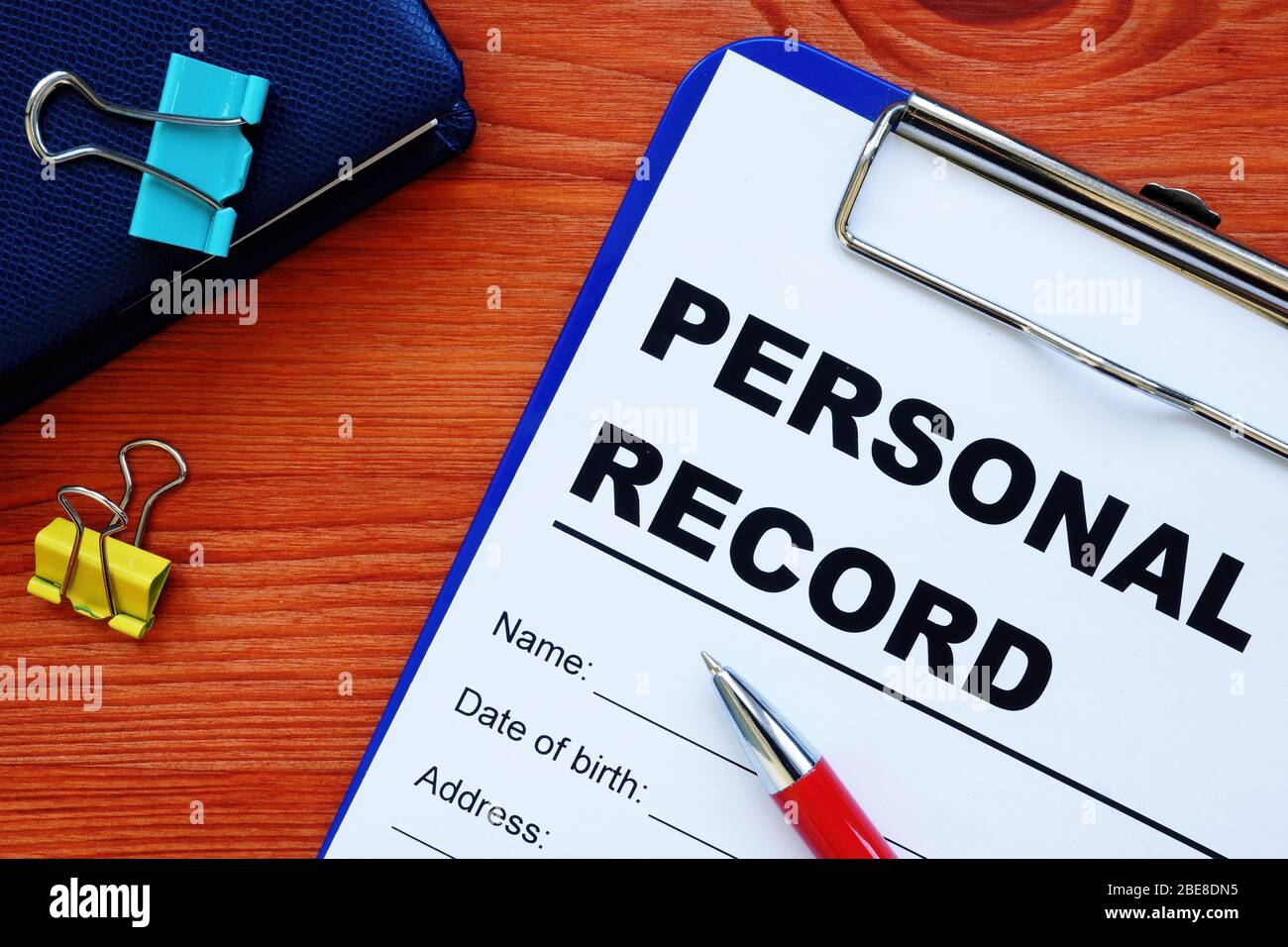 Personal records information form and other papers with pen Stock Photo ...