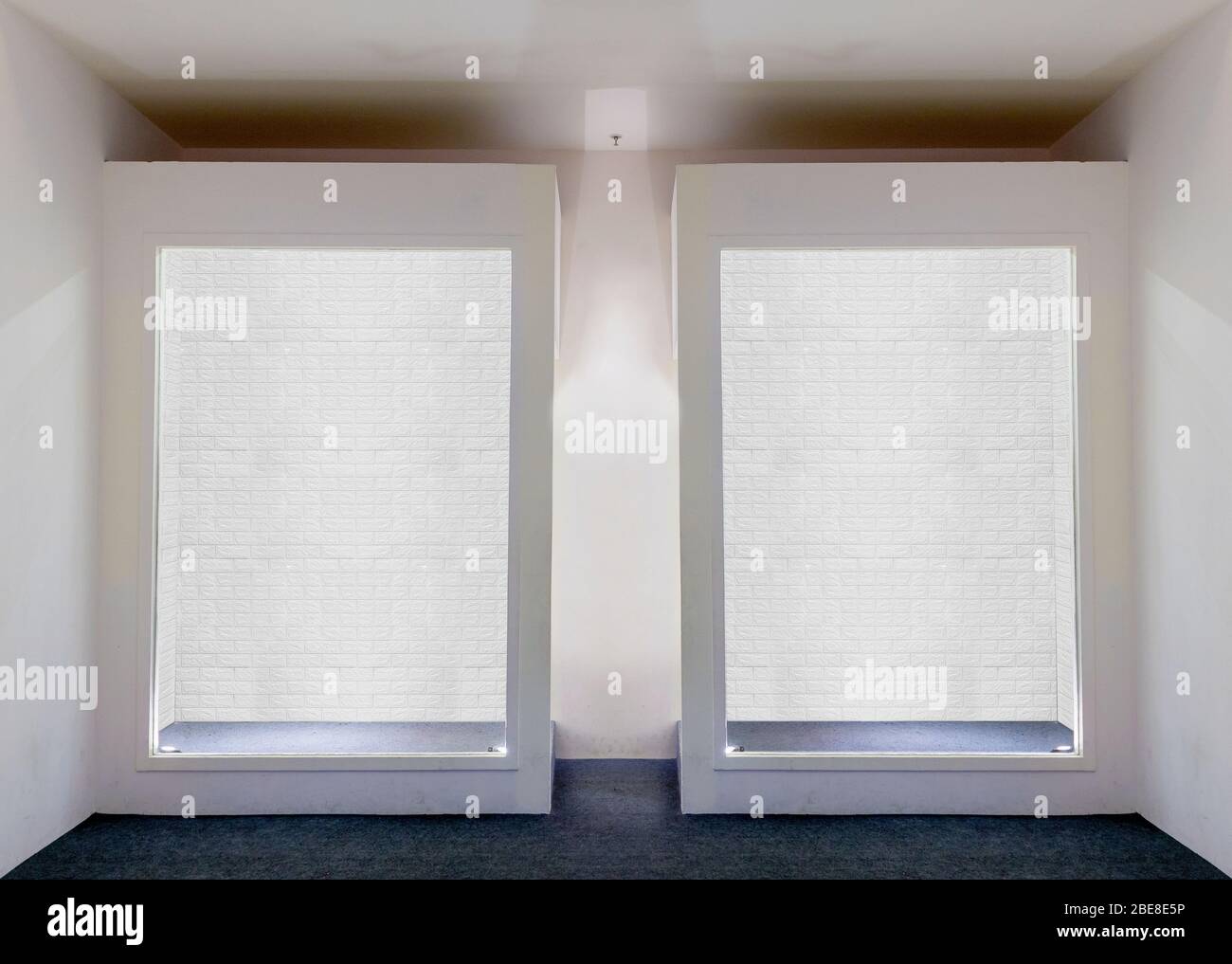 Empty glass showcase display for showing product with white wall ...