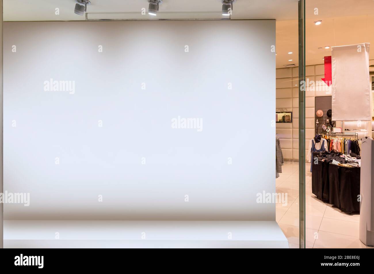 Empty glass showcase display for showing product with white wall ...