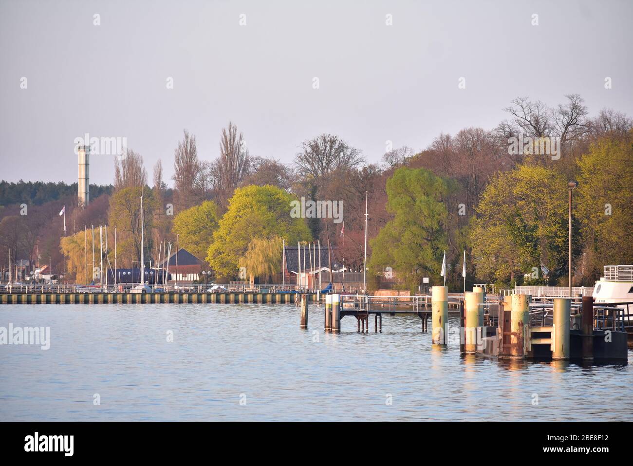 Dock and tree scene in lake in Wannsee Berlin Stock Photo - Alamy