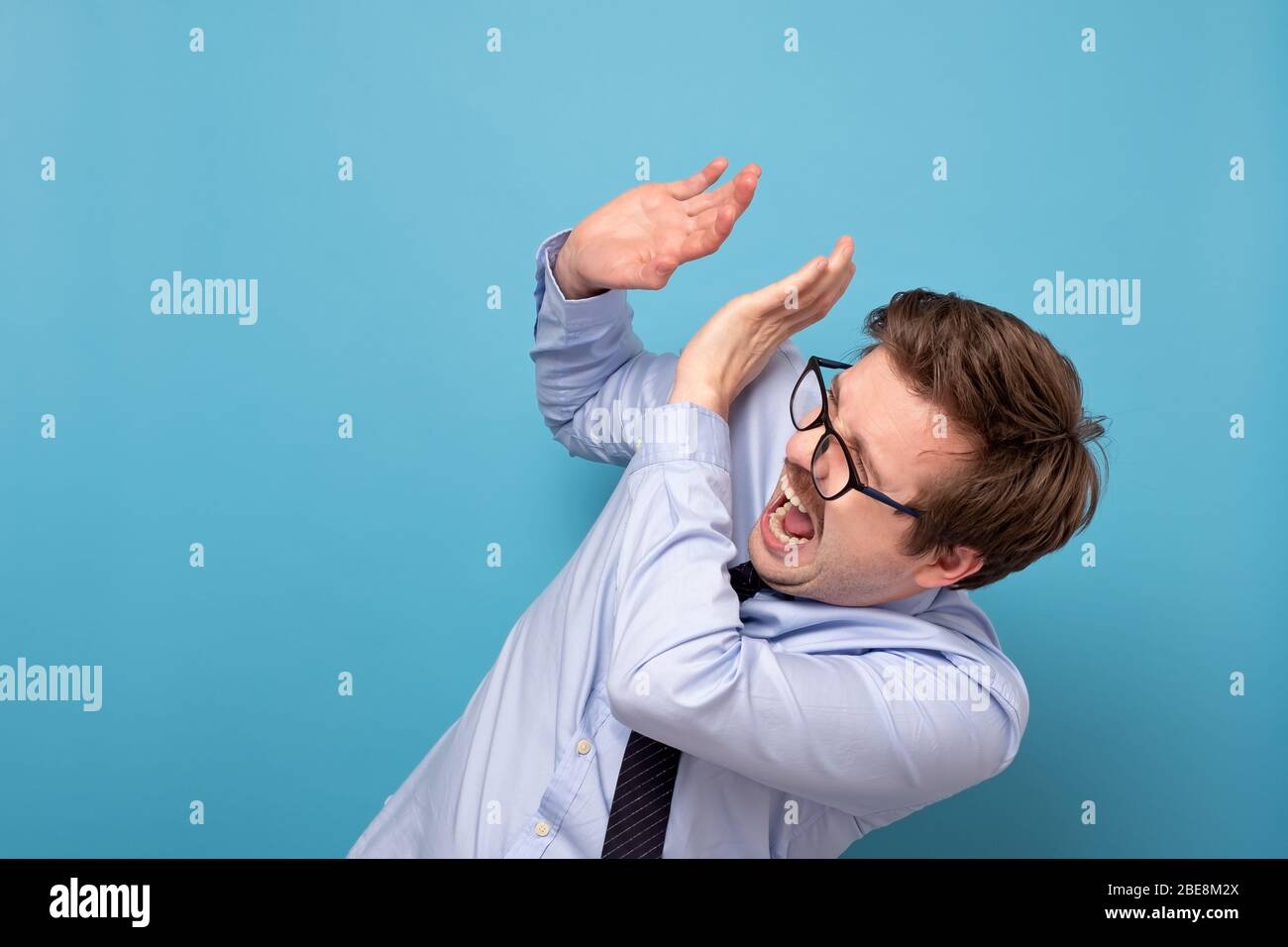 Person holding something heavy hi-res stock photography and images - Alamy