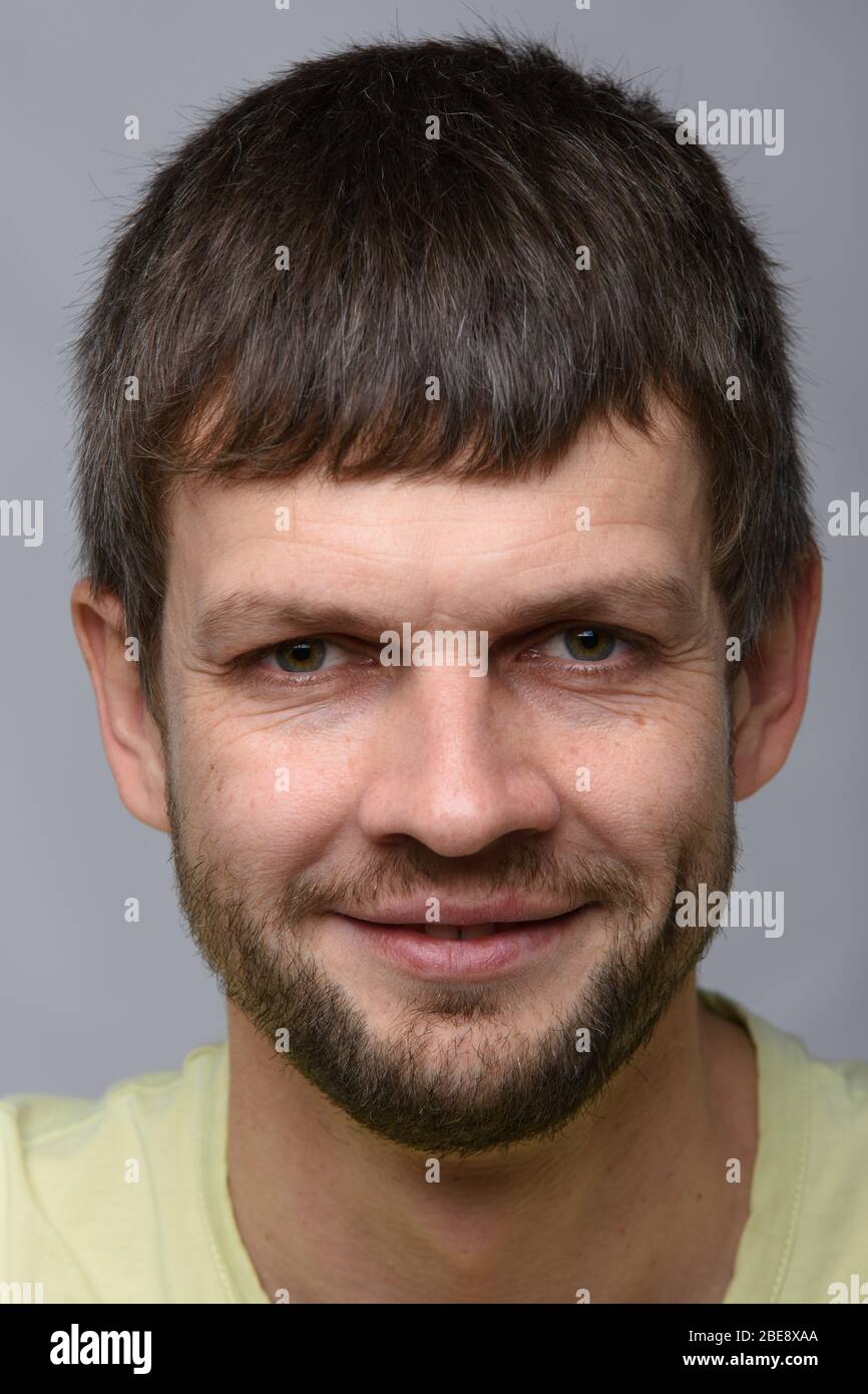 Closeup portrait of a successful smiling man of European appearance ...