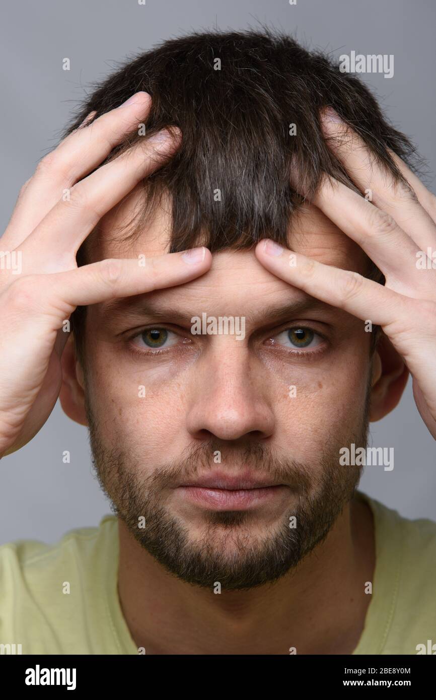 Hands clutching hair hi-res stock photography and images - Alamy