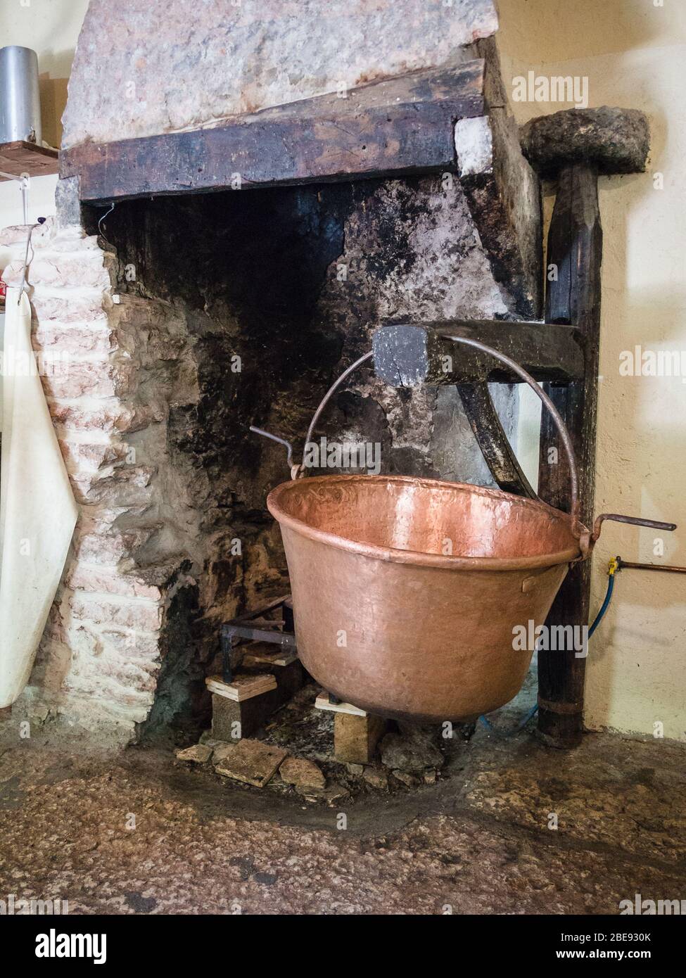 Old smoke-blackened fireplace with hanging copper pot Stock Photo - Alamy