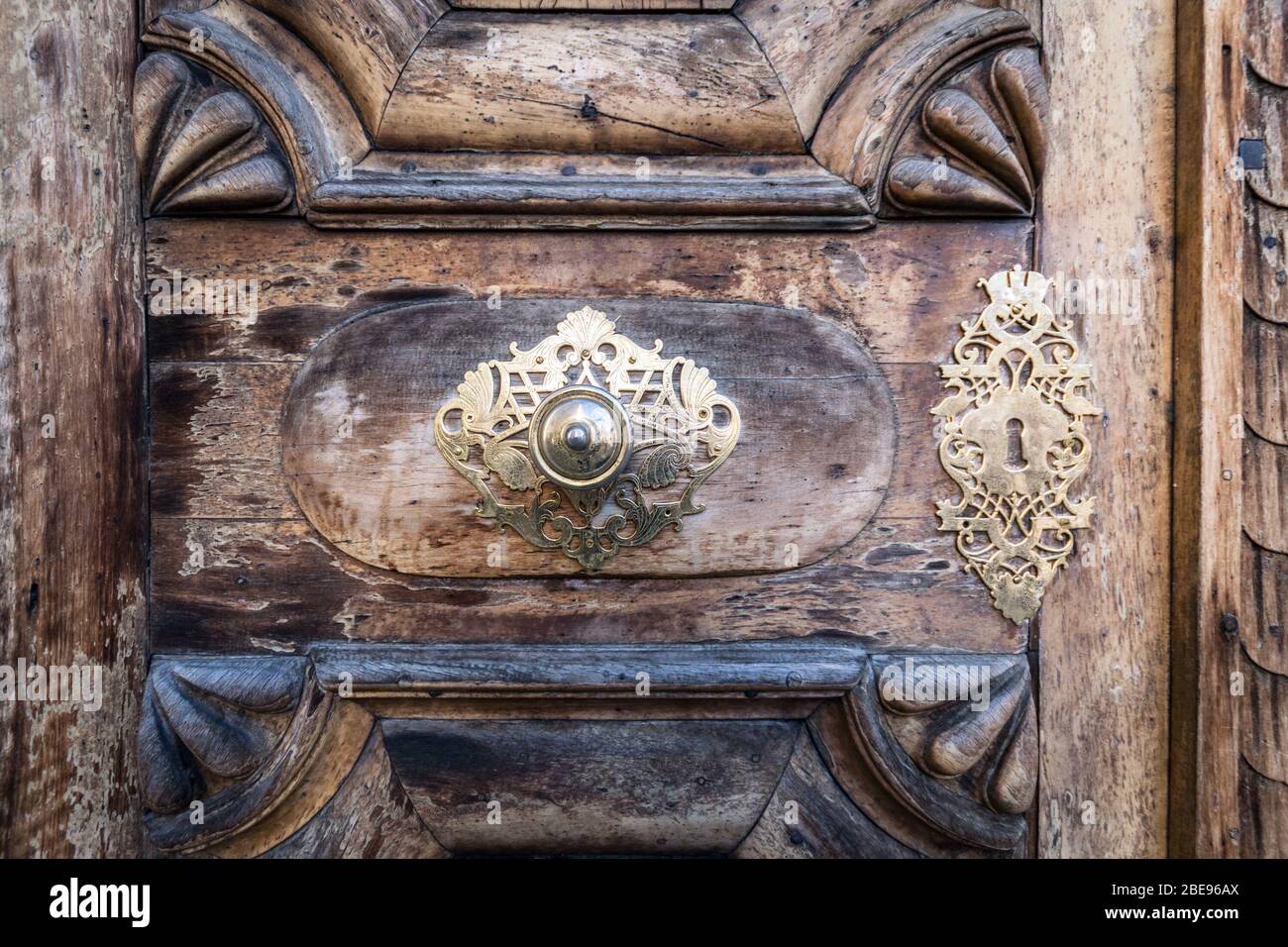 Golden metal decoration on the door of a Roman church used to protect ...