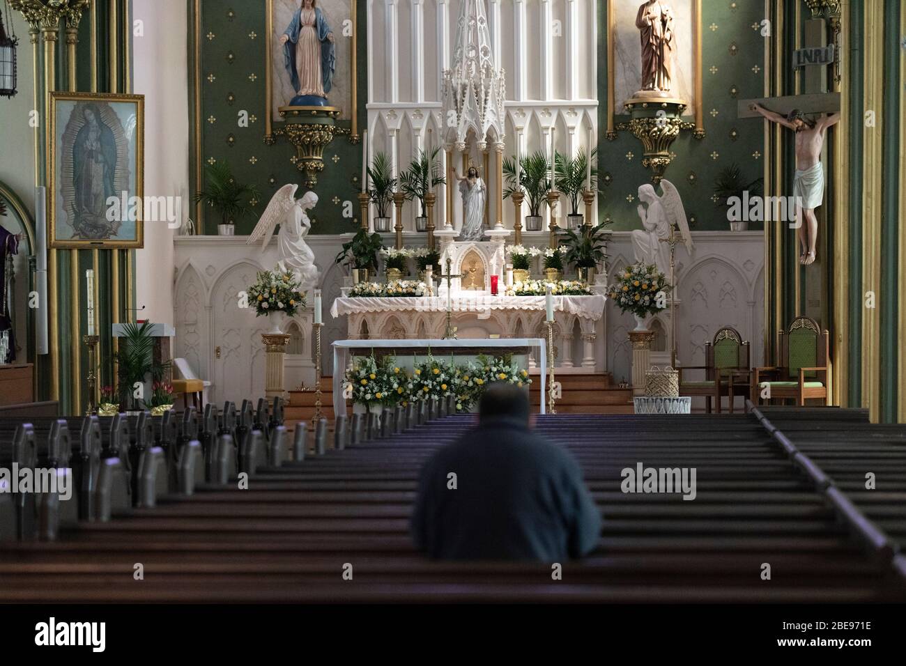 Person praying hi-res stock photography and images - Alamy