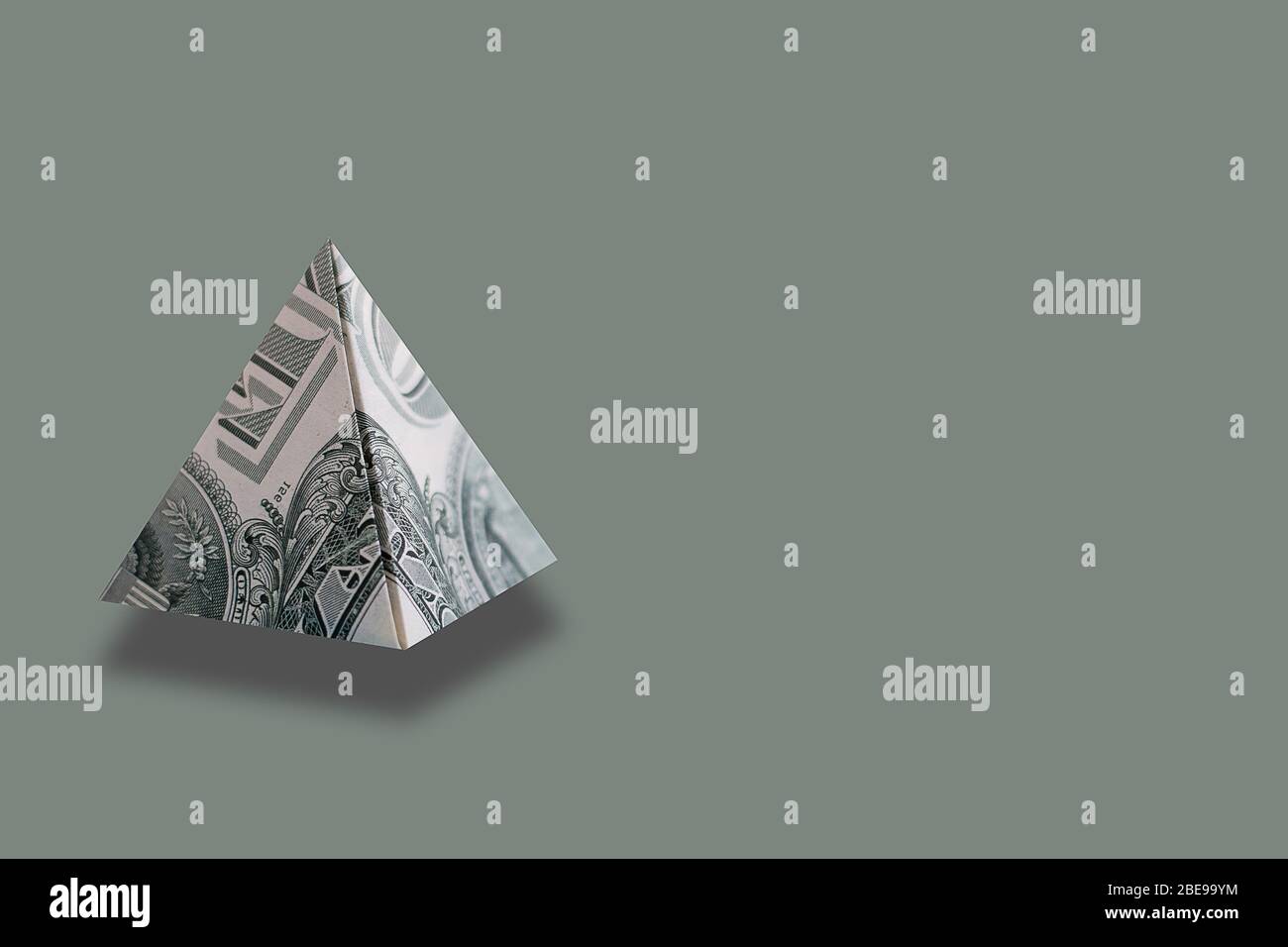 Money pyramid as symbol of global economic financial crisis. USA dollar ...