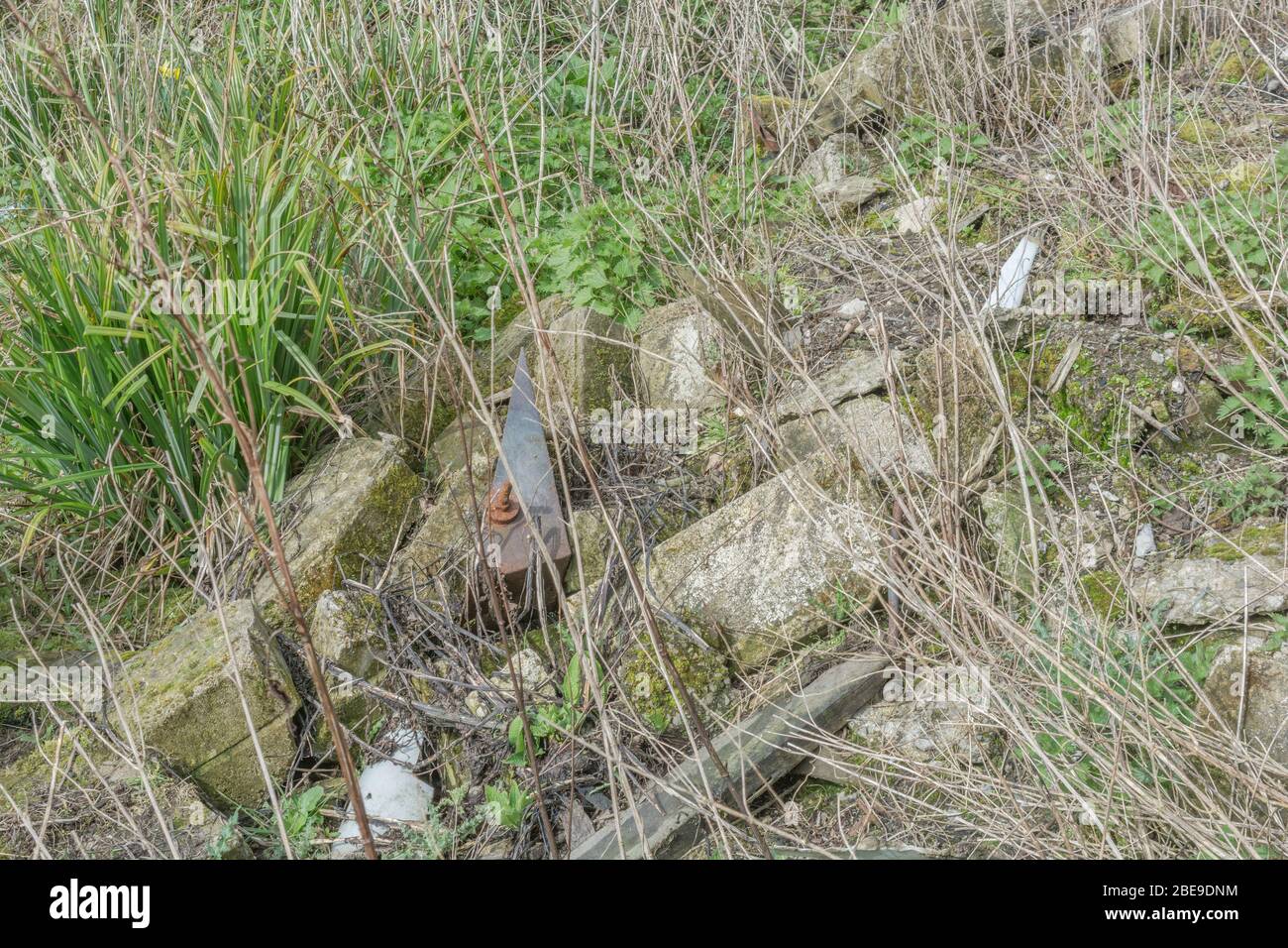 Pile of fly-tipped building rubble dumped in a rural setting Stock ...
