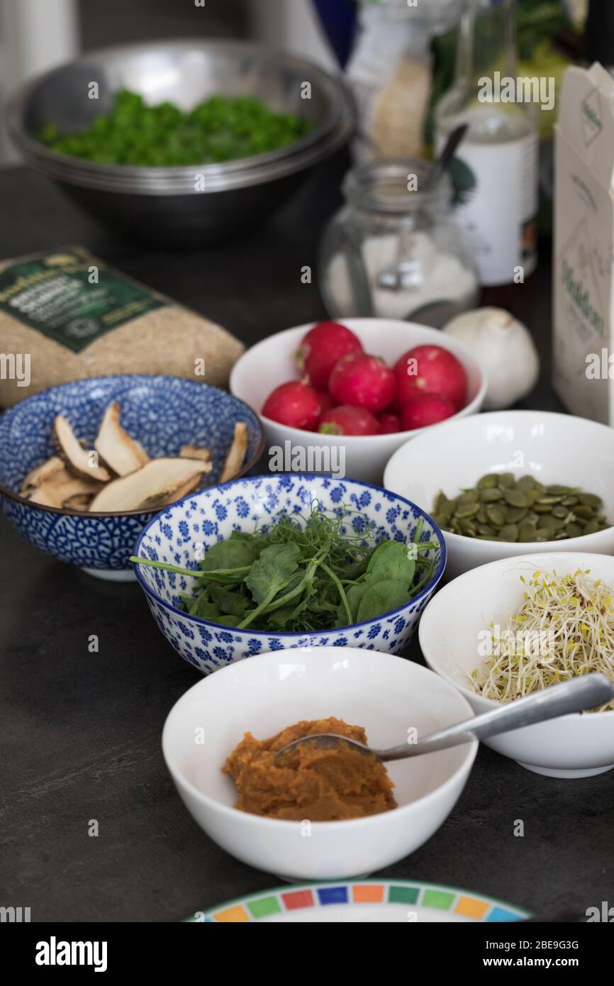 Healthy cooking ingredients, radishes, seeds, sprouts, mushrooms in ...