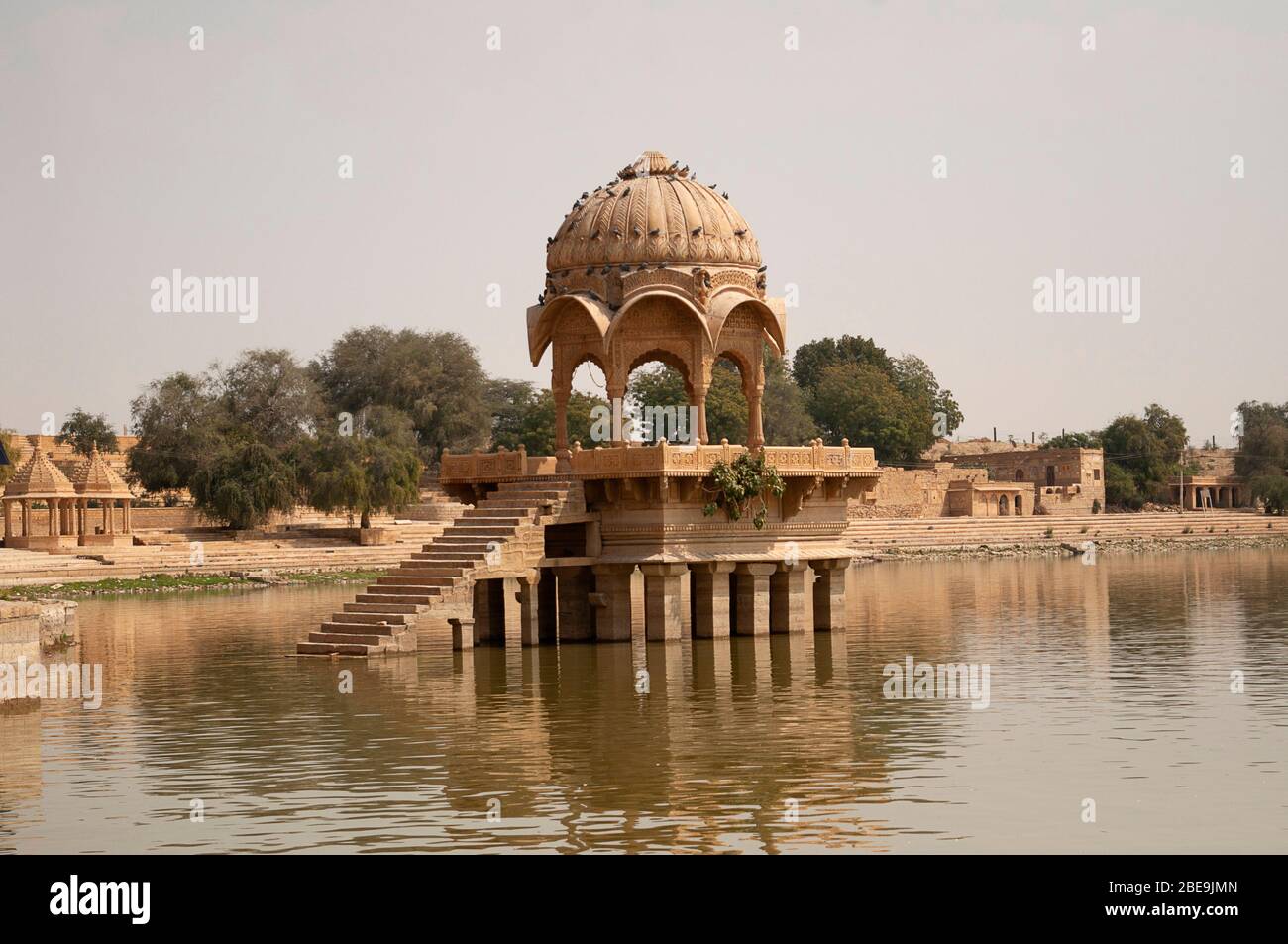 Gadi Sagar temple on Gadisar lake, Jaisalmer, Rajasthan, India Stock ...