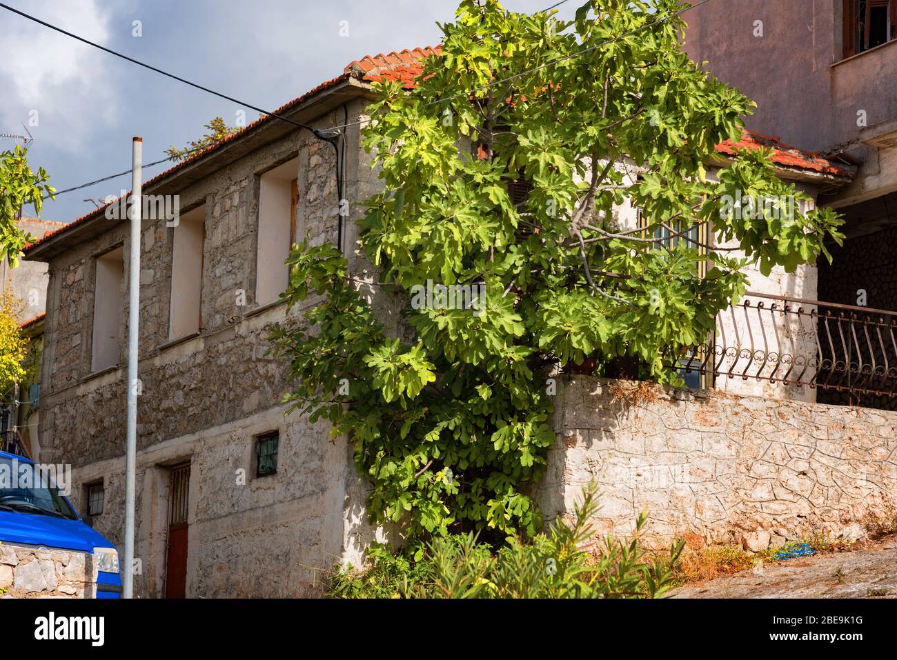 Typical small greek house on a sunny summer day at Keri village ...