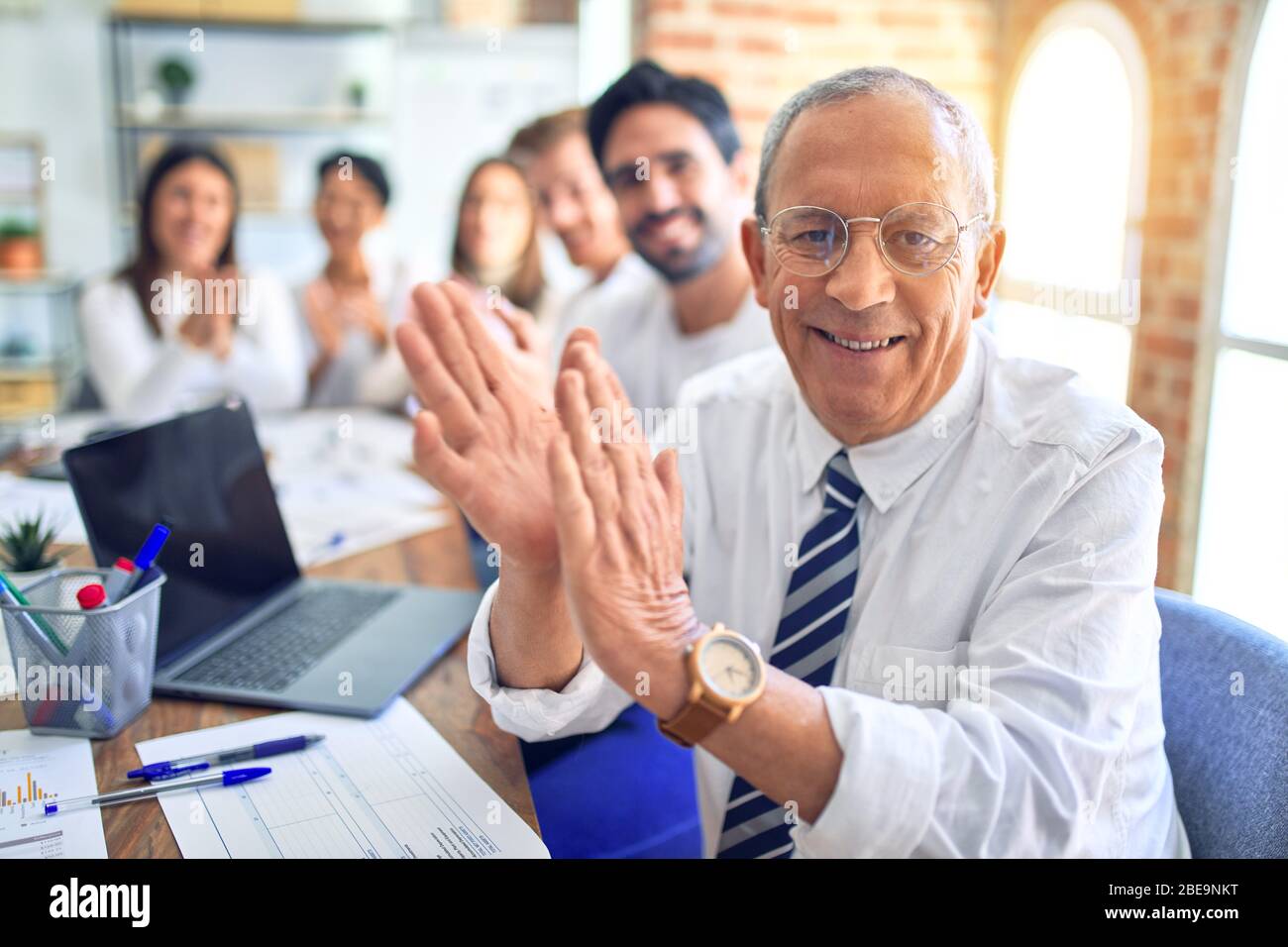 Group of business workers smiling happy and confident. Working together ...