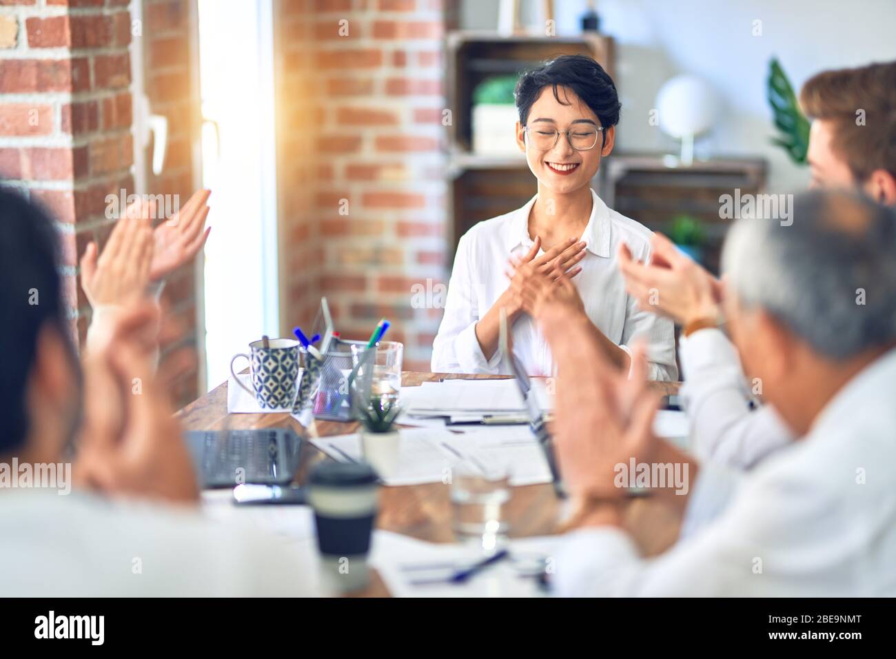 Group of business workers smiling happy and confident. Working together ...