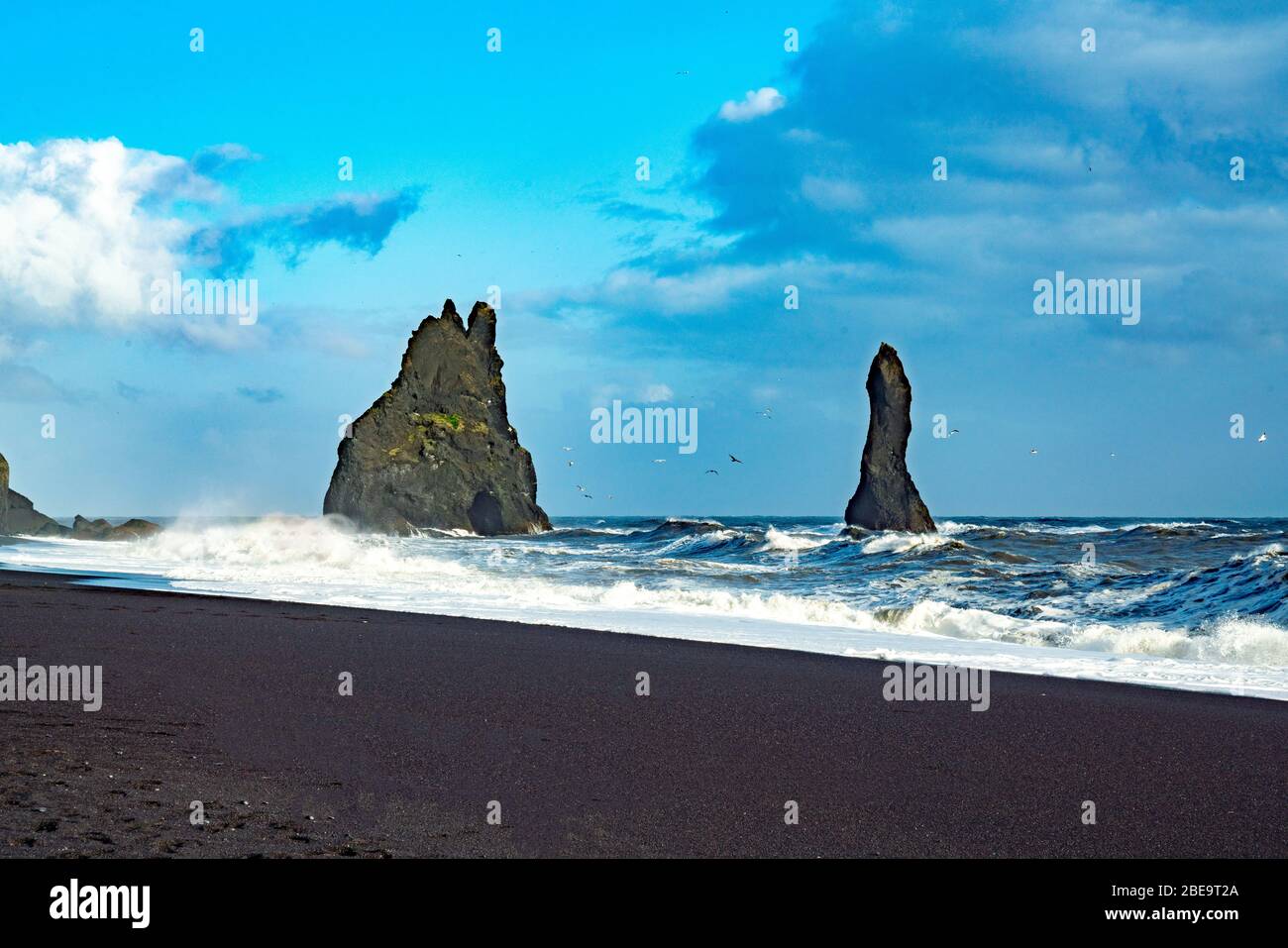 The cliffs by the township of Vik in Iceland Reynisdrangar basalt sea ...