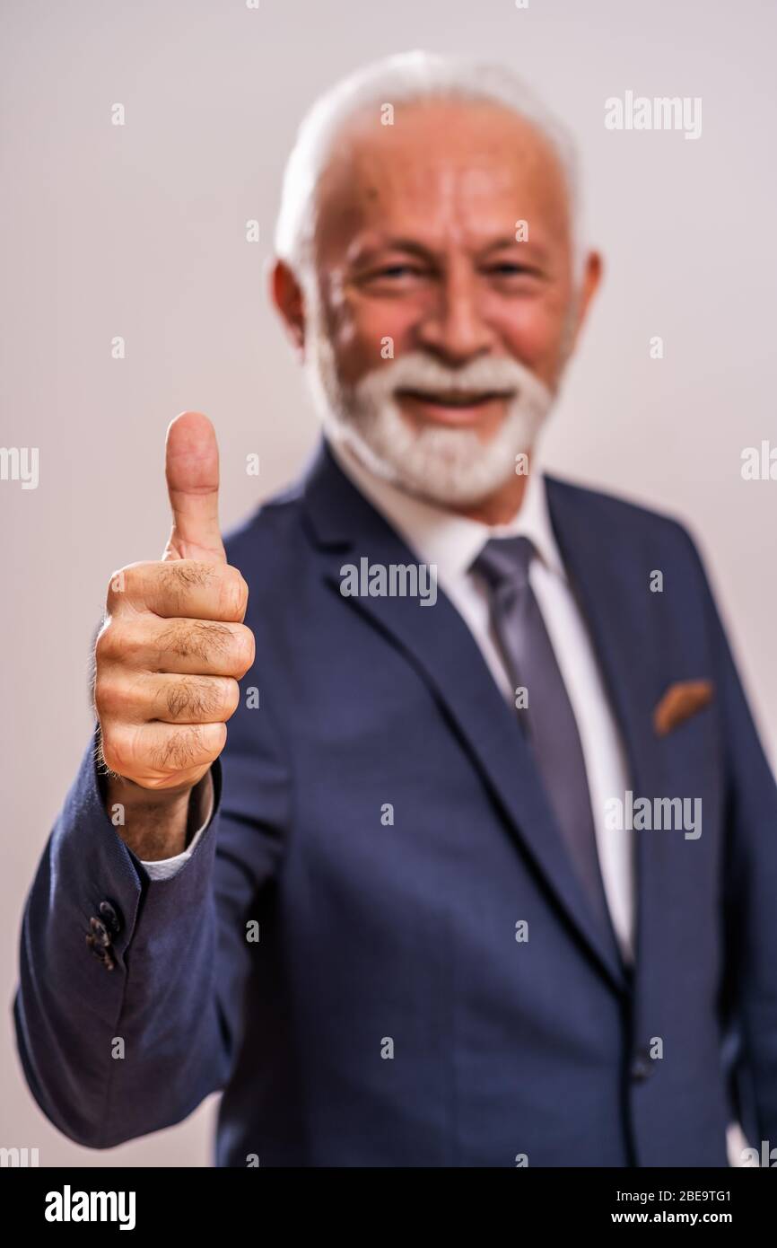 Portrait of happy and successful senior businessman Stock Photo - Alamy