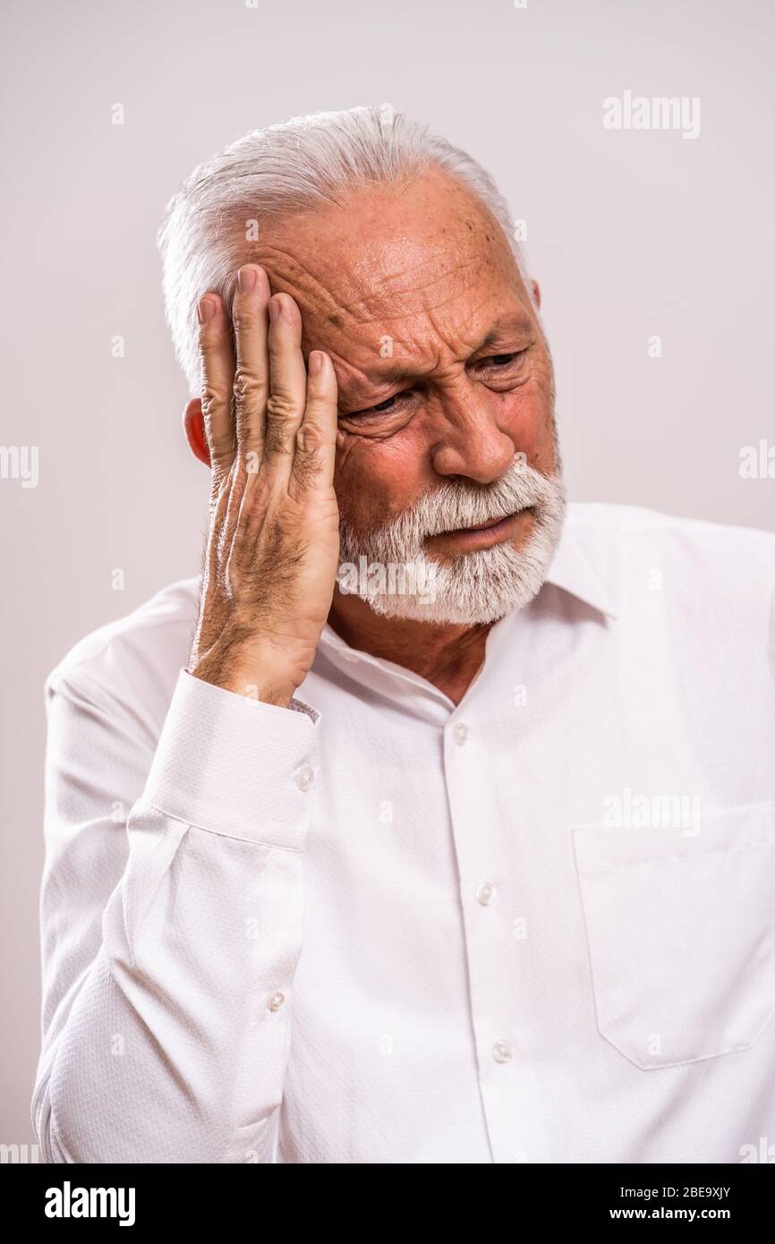 Senior man sad depressed expression hi-res stock photography and images ...