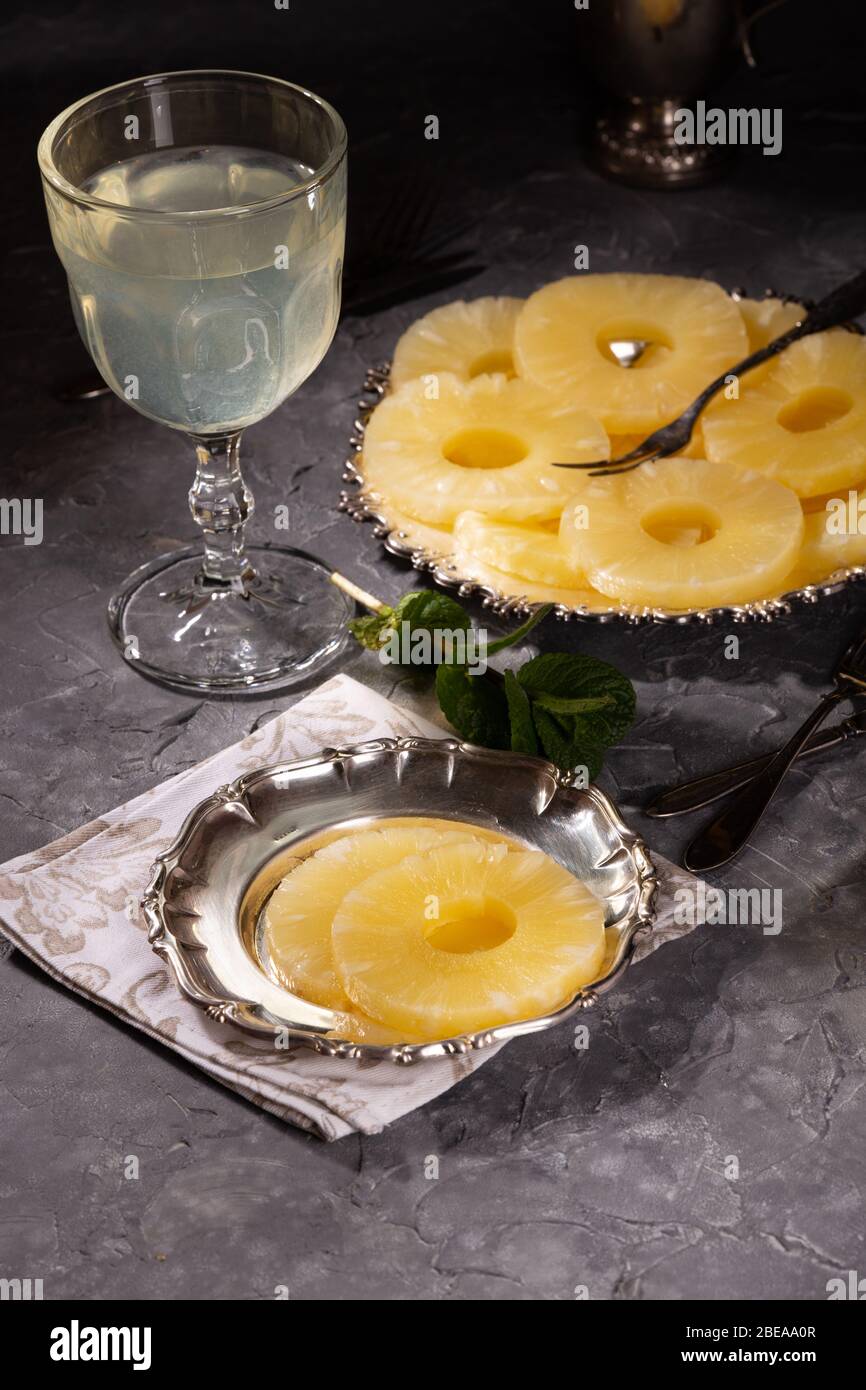 Canned pineapple, cut into rings Stock Photo - Alamy